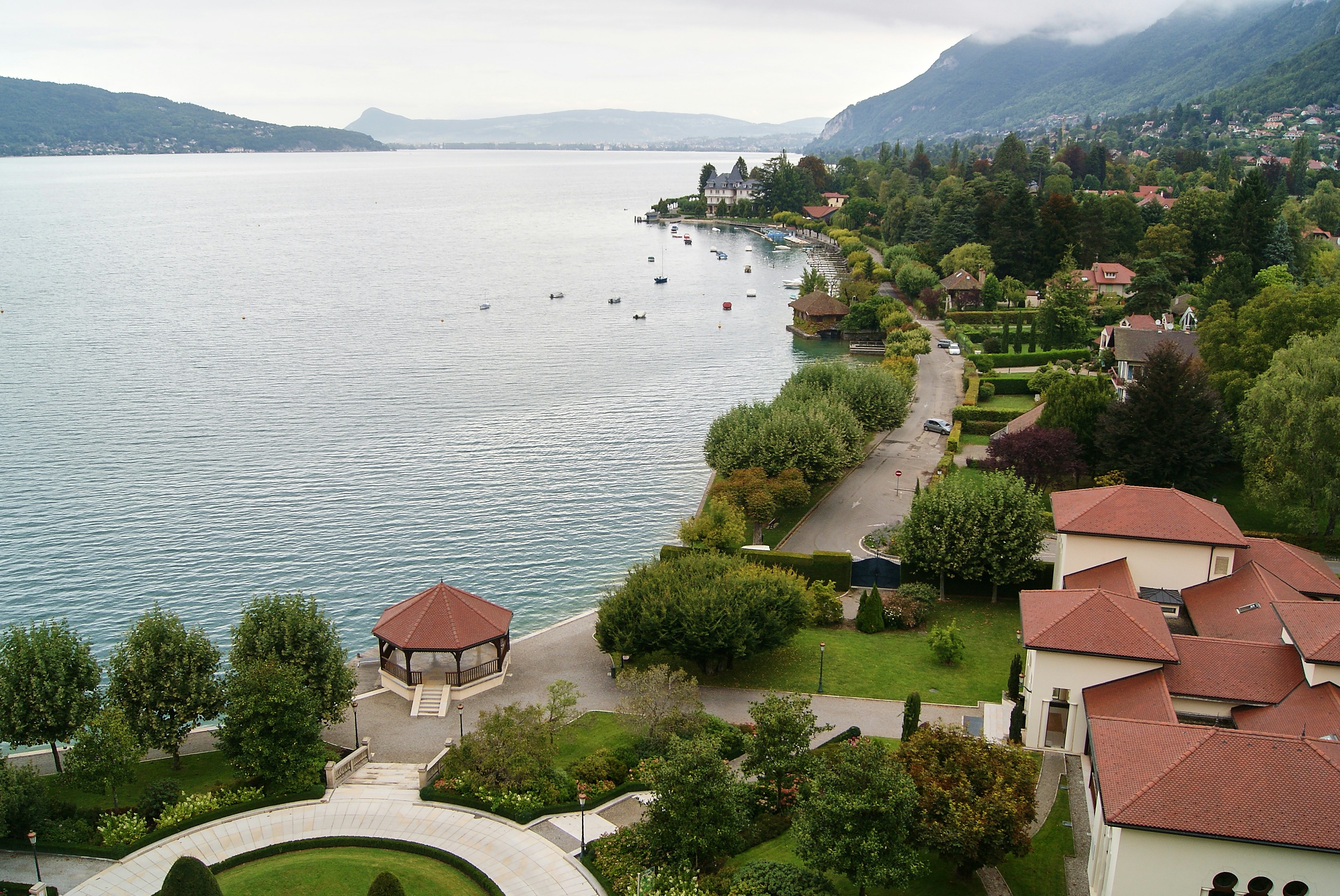 Green trees near body of water during daytime photo – Free Annecy Image ...