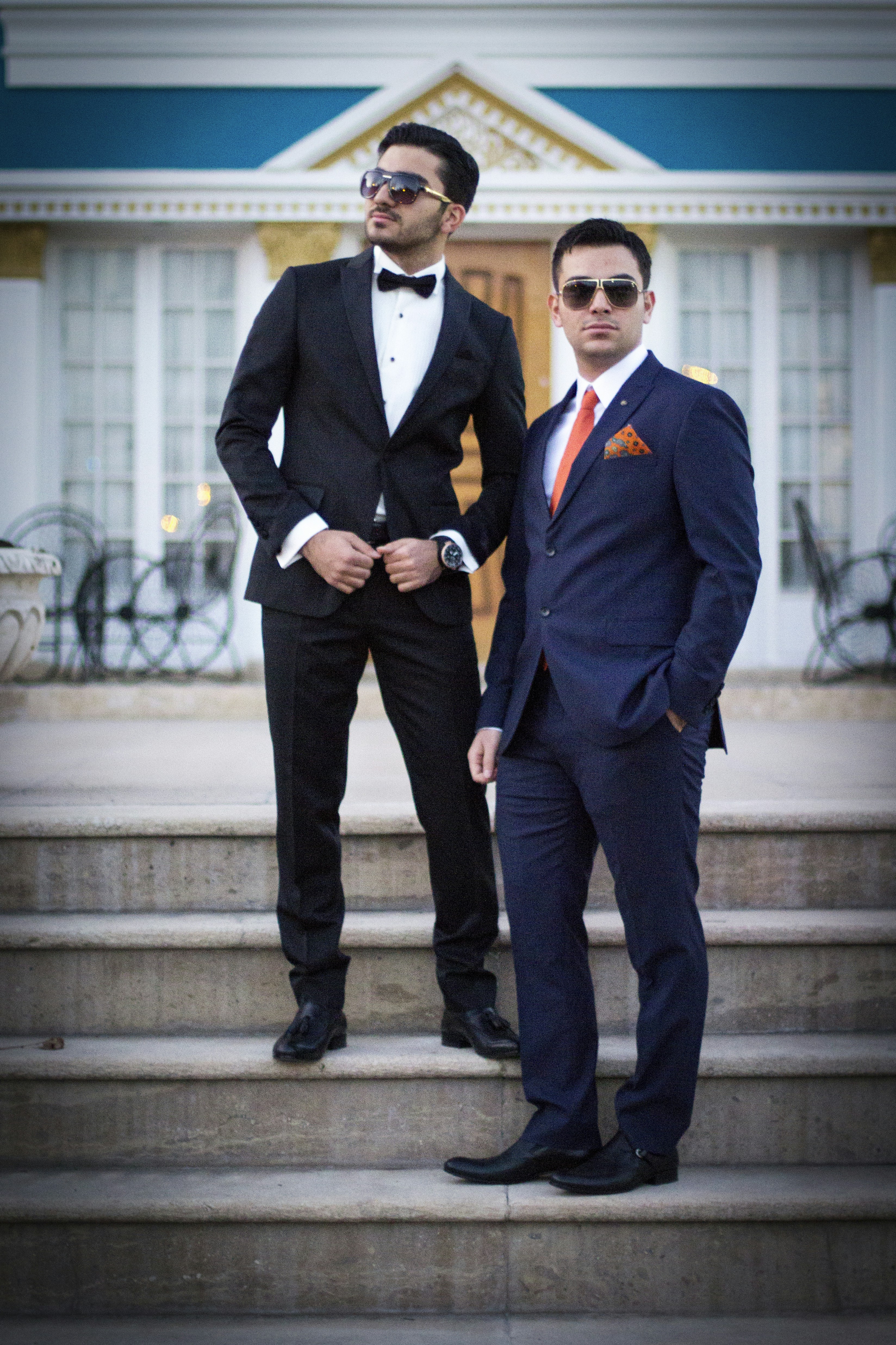 Dressed to Command: Two Gents in Tailored Shadows on the Mansion Steps