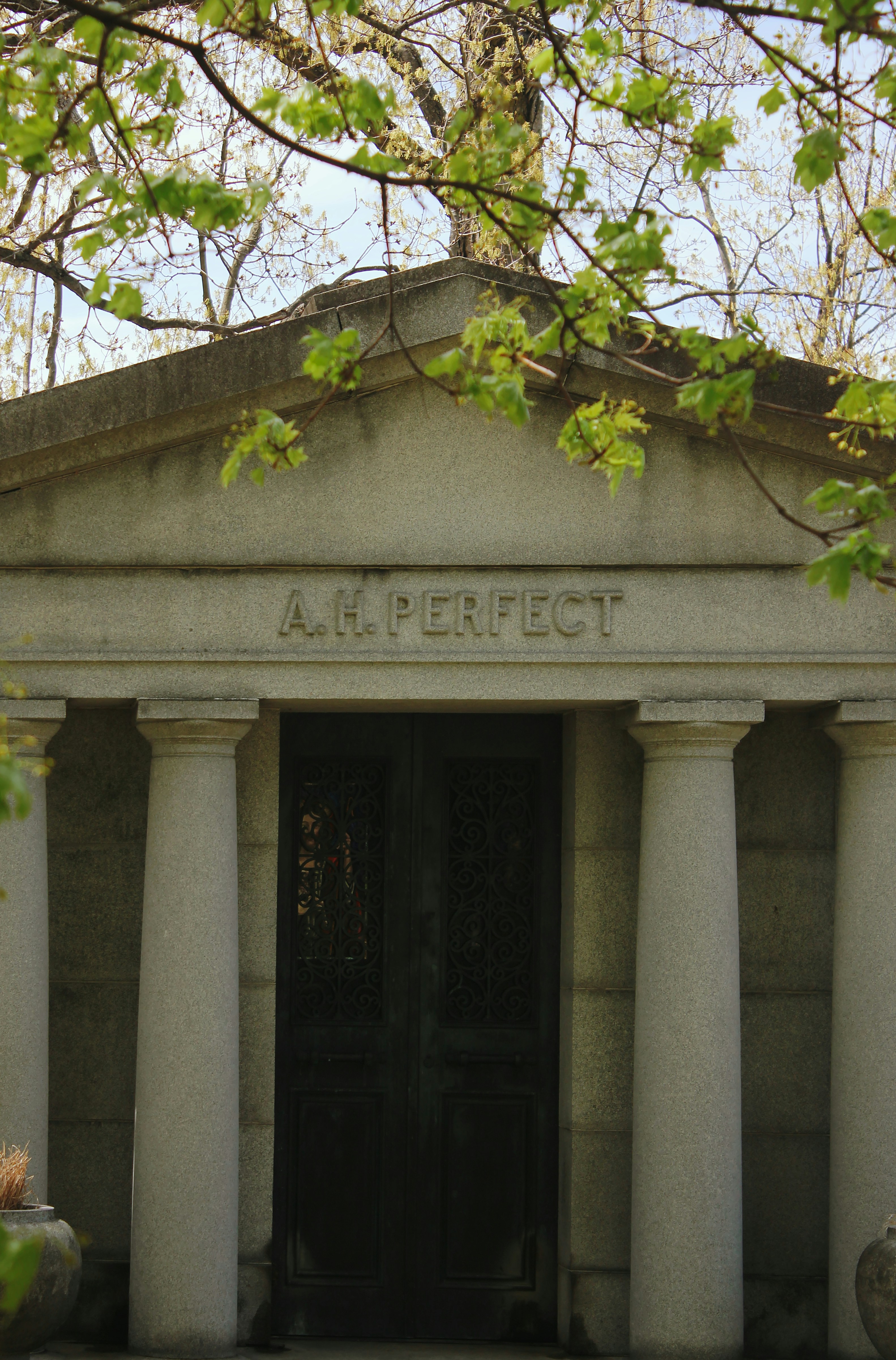 The A.H. Perfect Mausoleum: Quiet Columns Beneath a Canopy of Green
