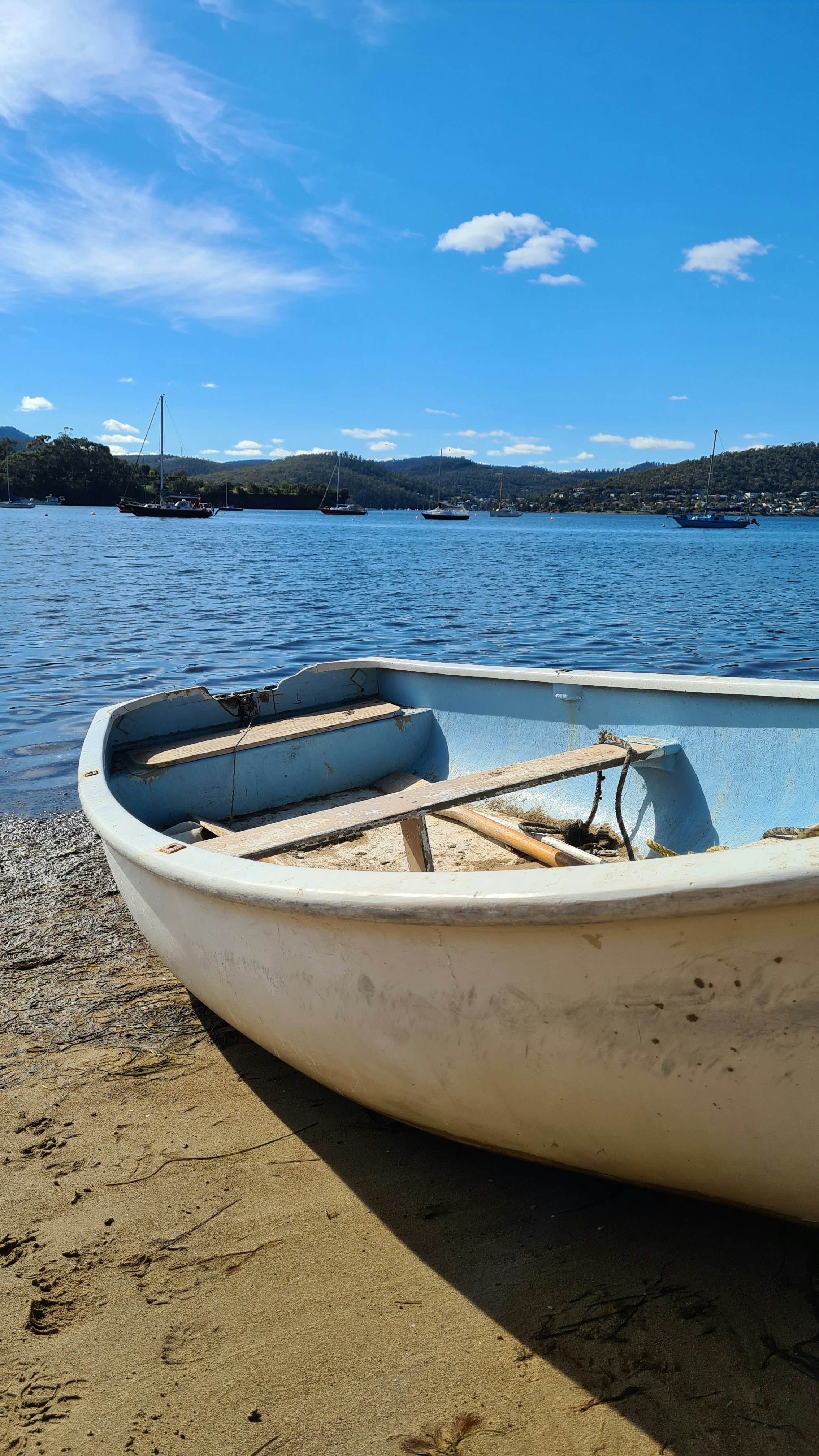 Row boat on shore