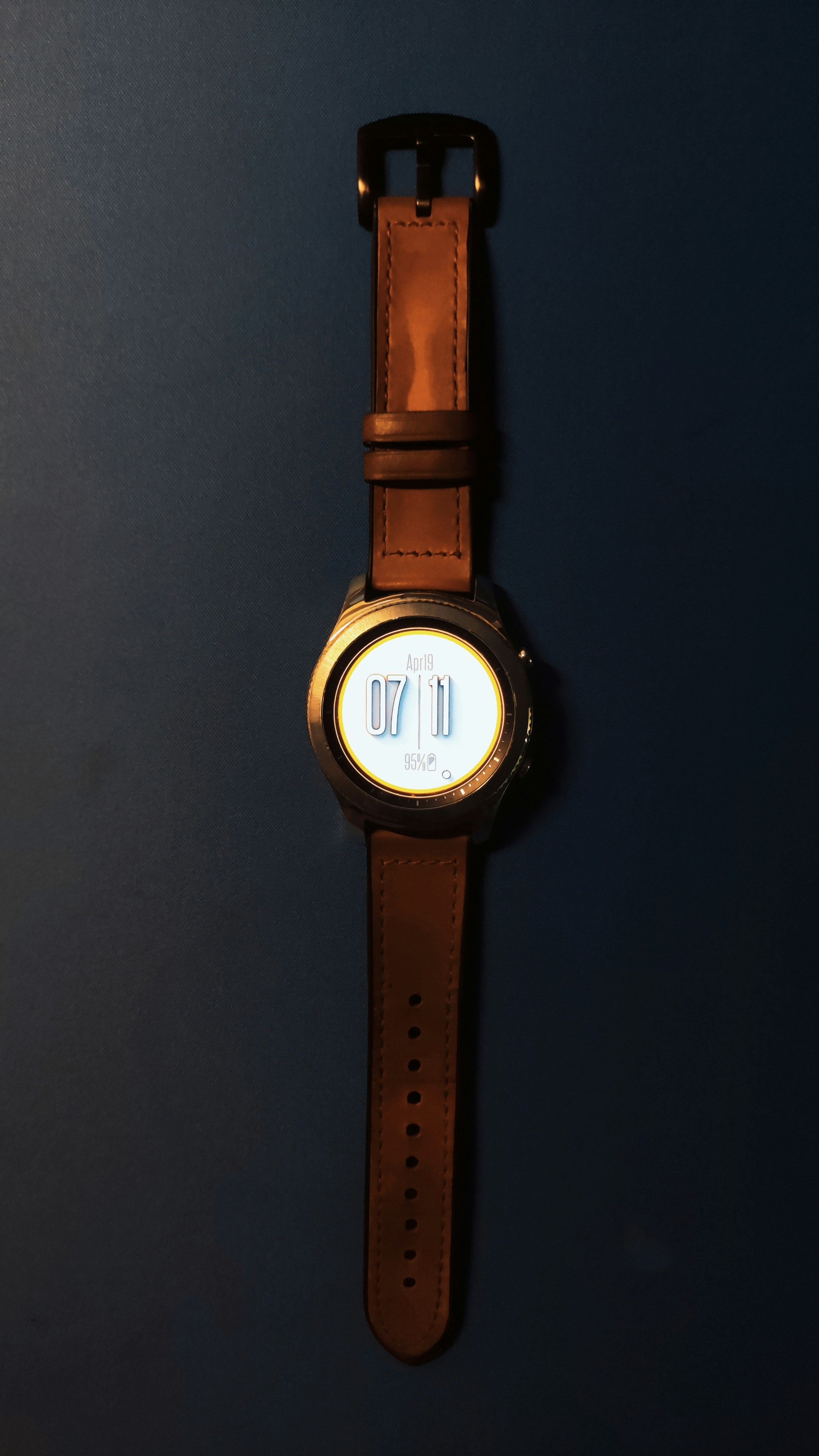 brown leather strap gold round analog watch