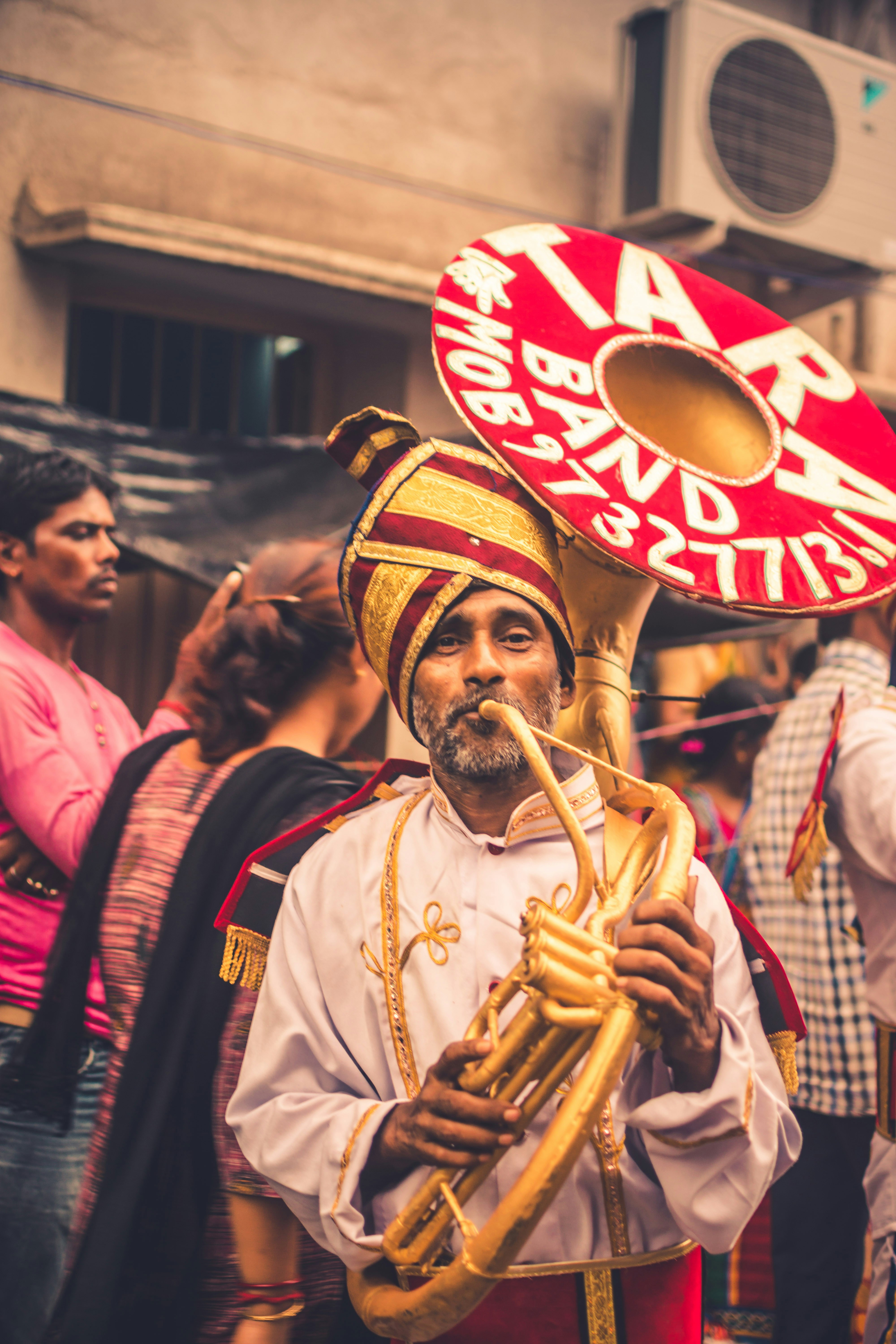 Man in white and red costume playing trumpet photo – Free Human Image ...