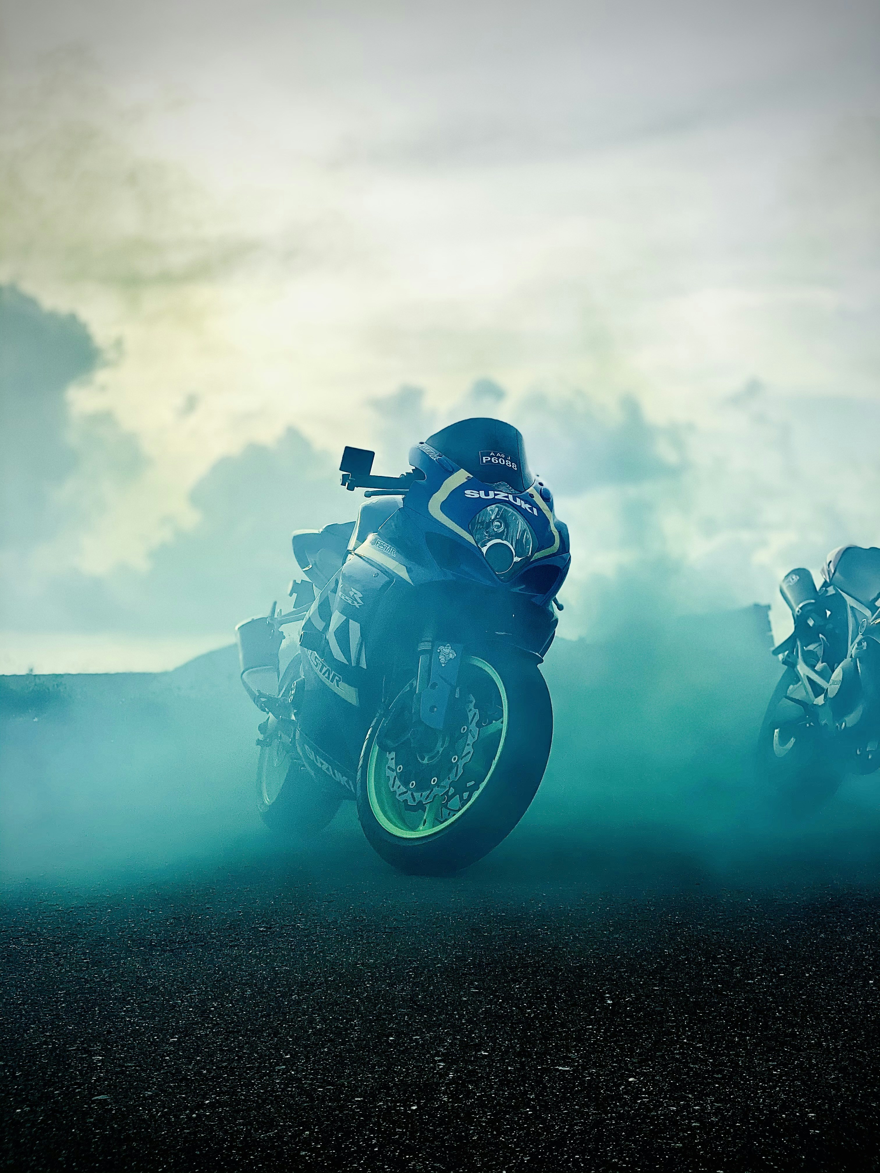 Burnout in Blue: A Neon Mist Drift of Motorbike Smoke