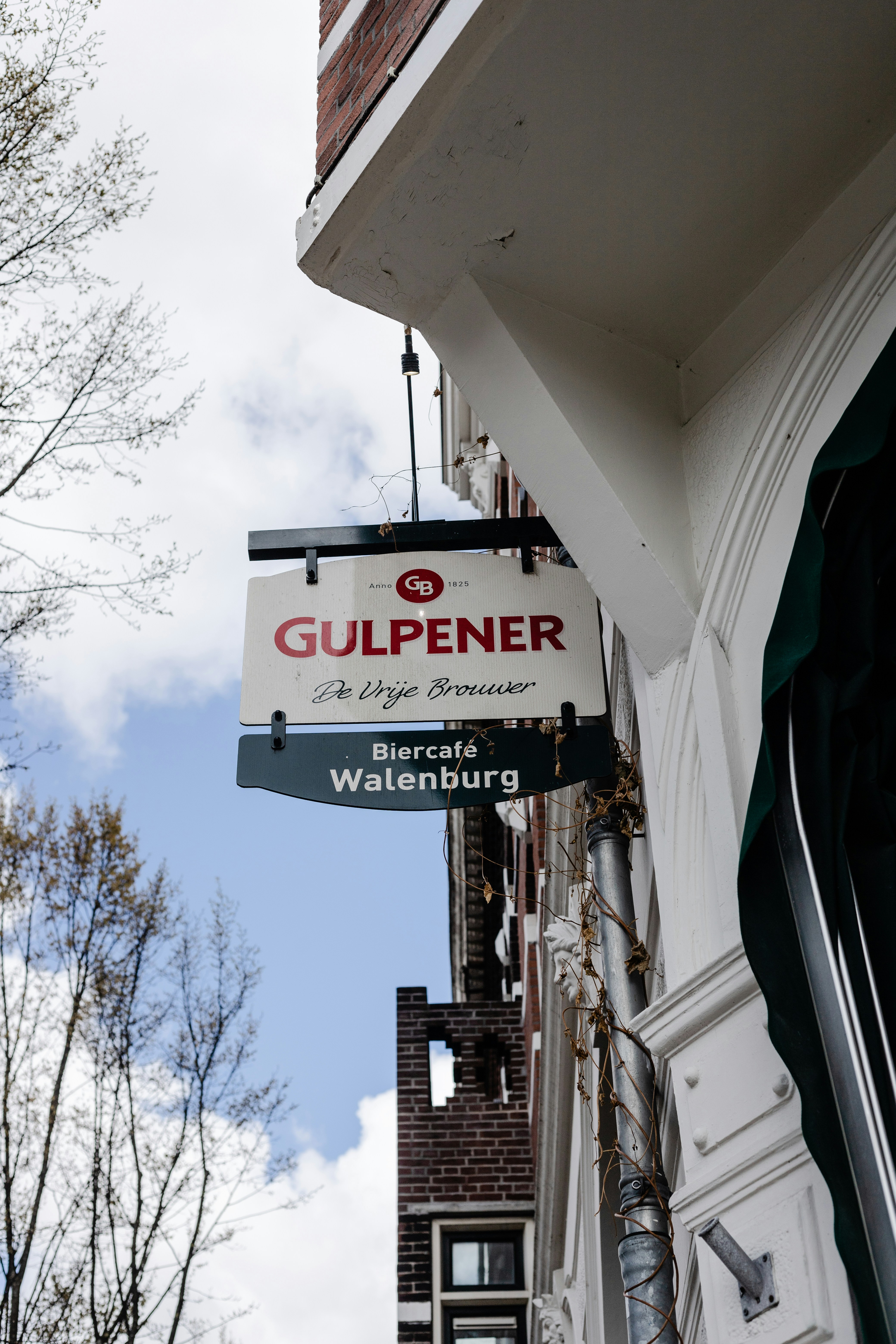 Signboard in the Street: Gulpener Bier Café