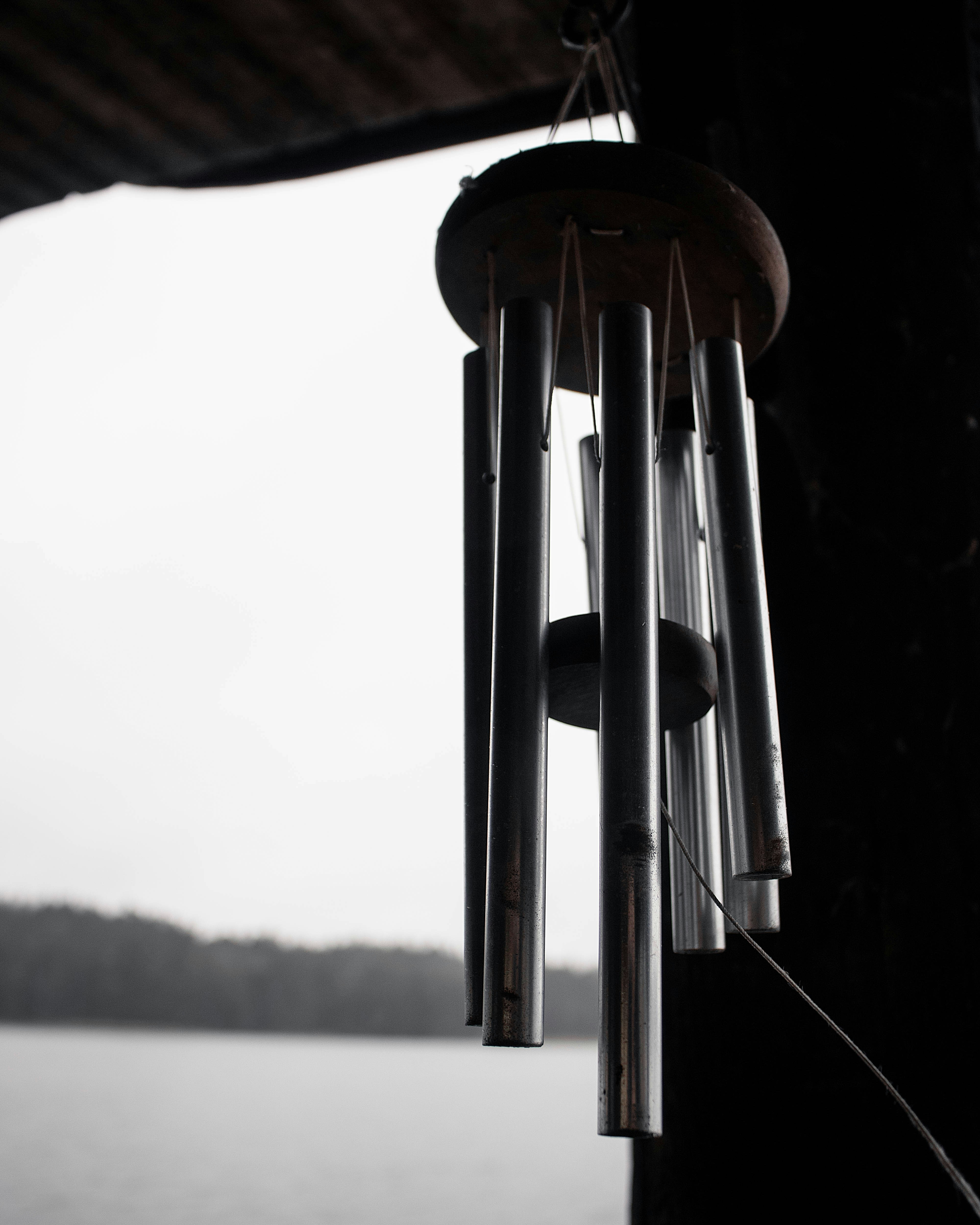 Brown wind chime on roof photo – Free Sparreholm Image on Unsplash
