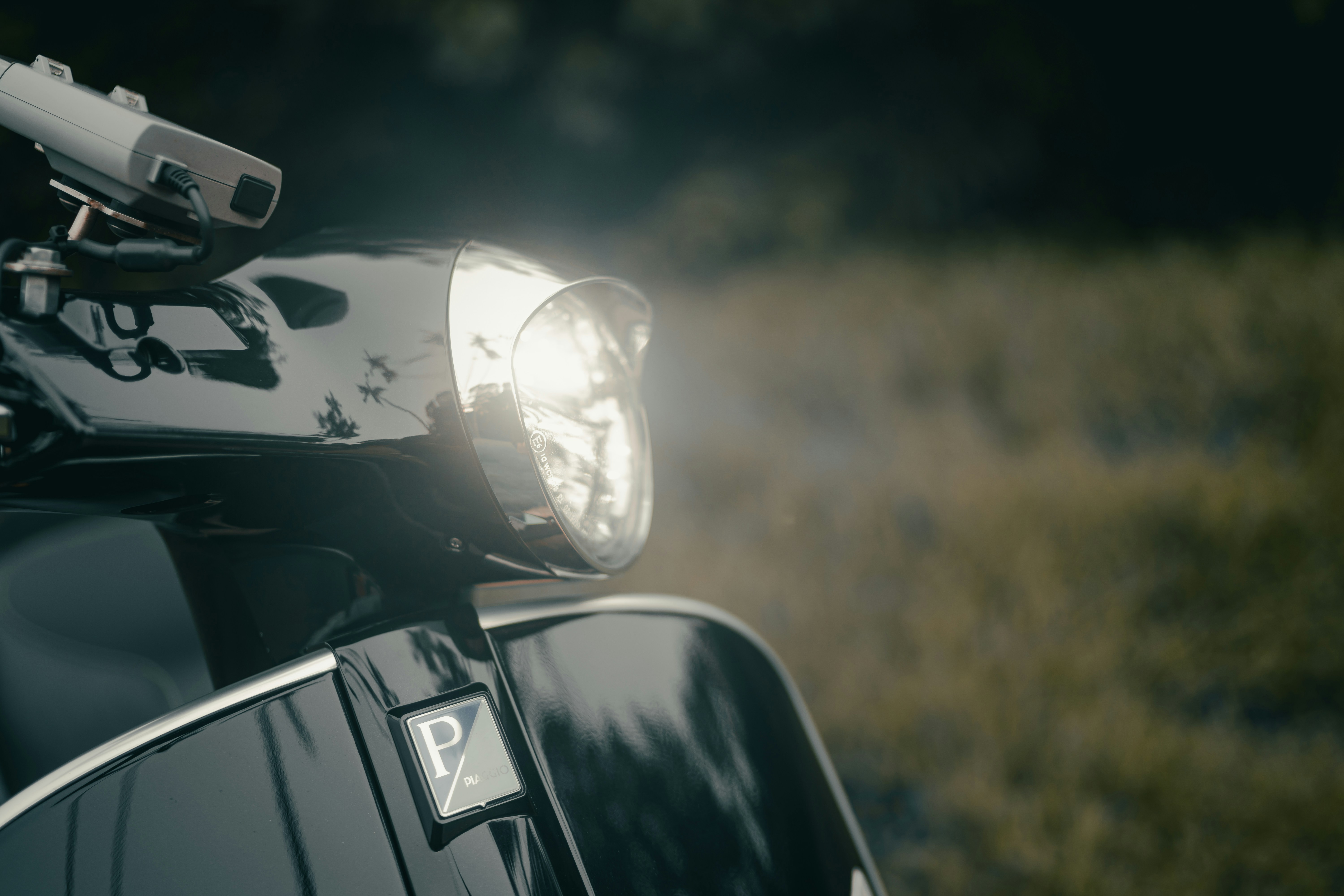 Muted Glimmer: Vintage Bike Headlamp in Soft Evening Light