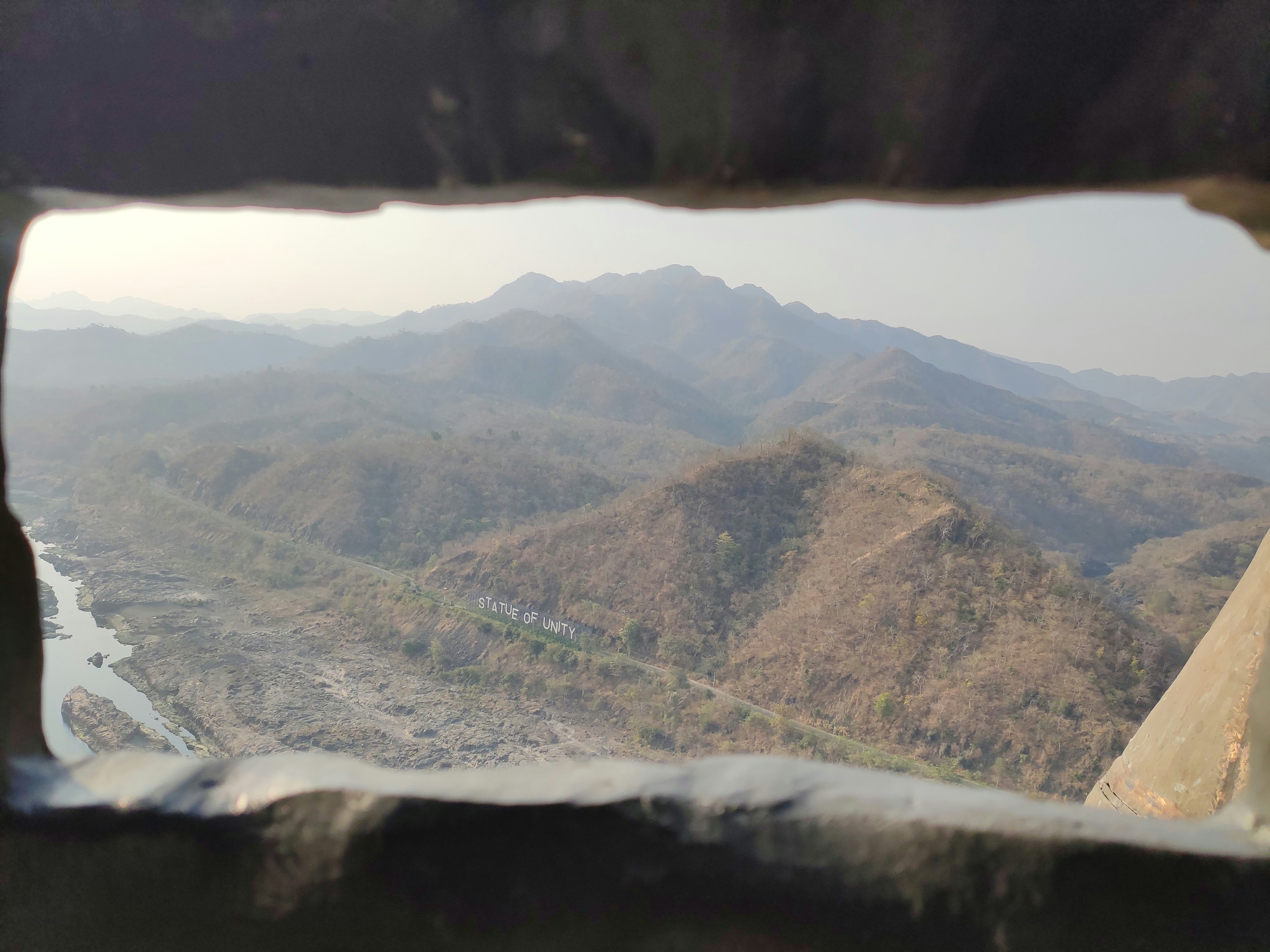 Inside from theStatue of unity , which is world largest statue | green and brown mountains during daytime