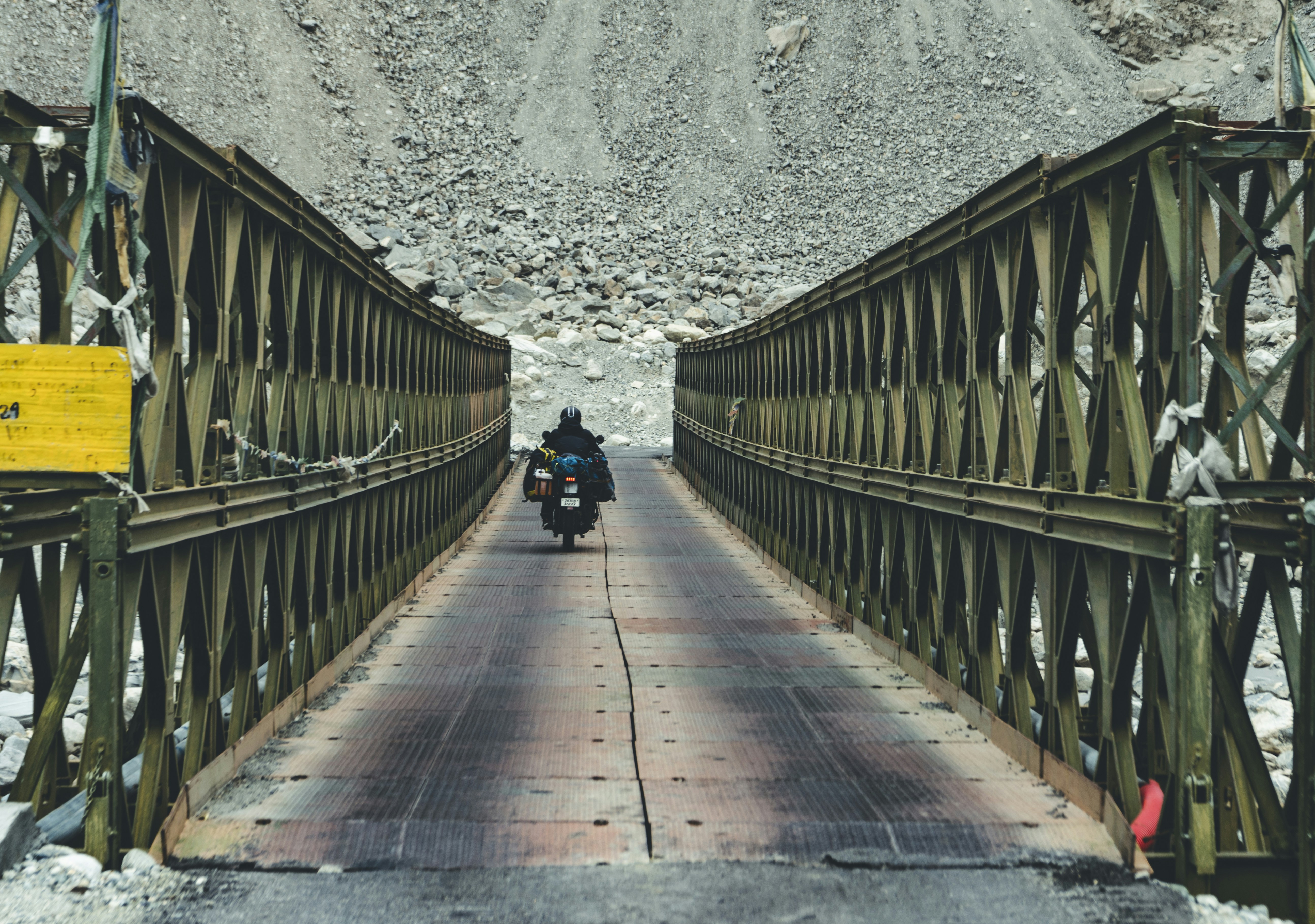 Motorcycle Quiet on a Steel Span
