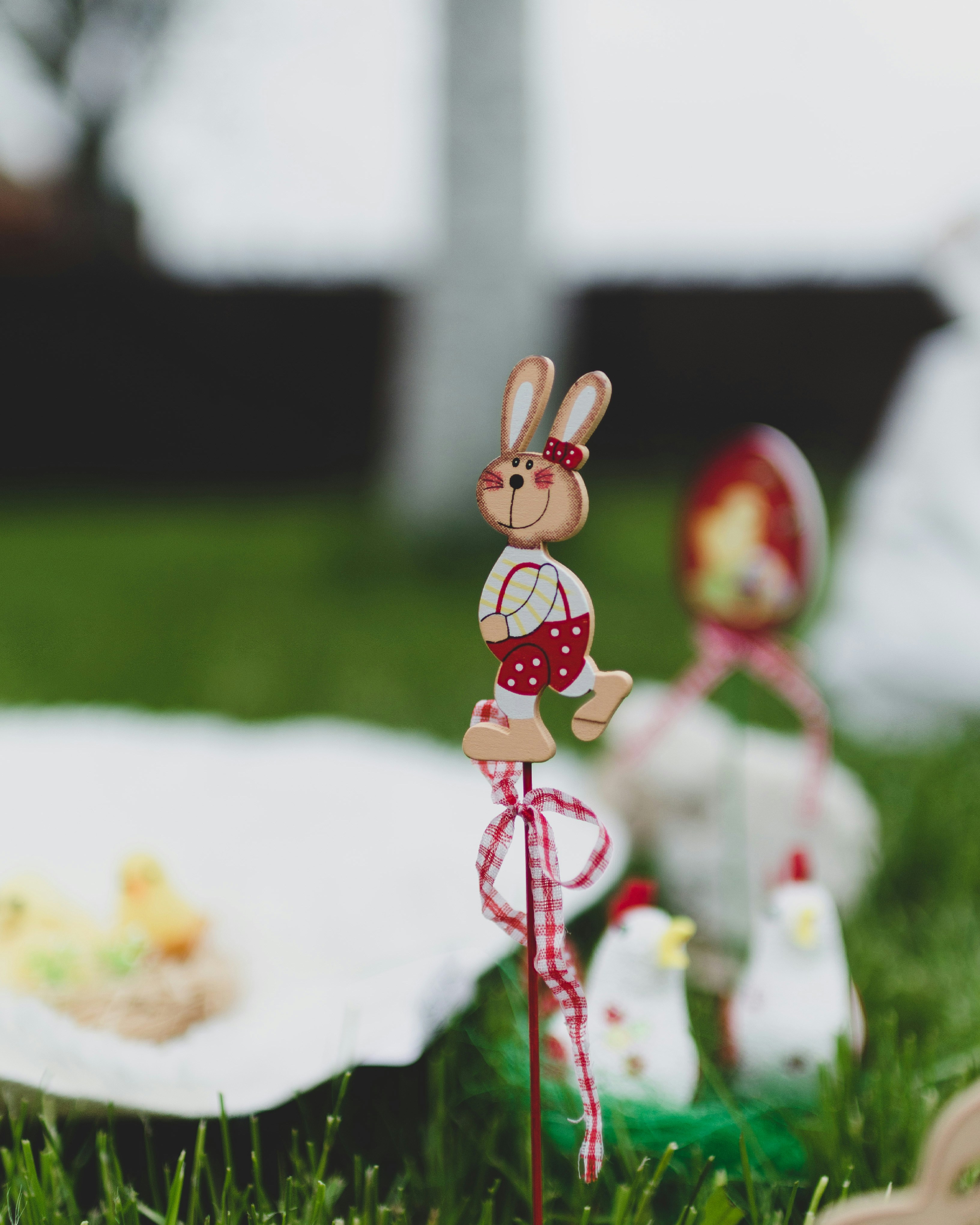 Ribbon-Wound Bunny in a Sunlit Easter Garden