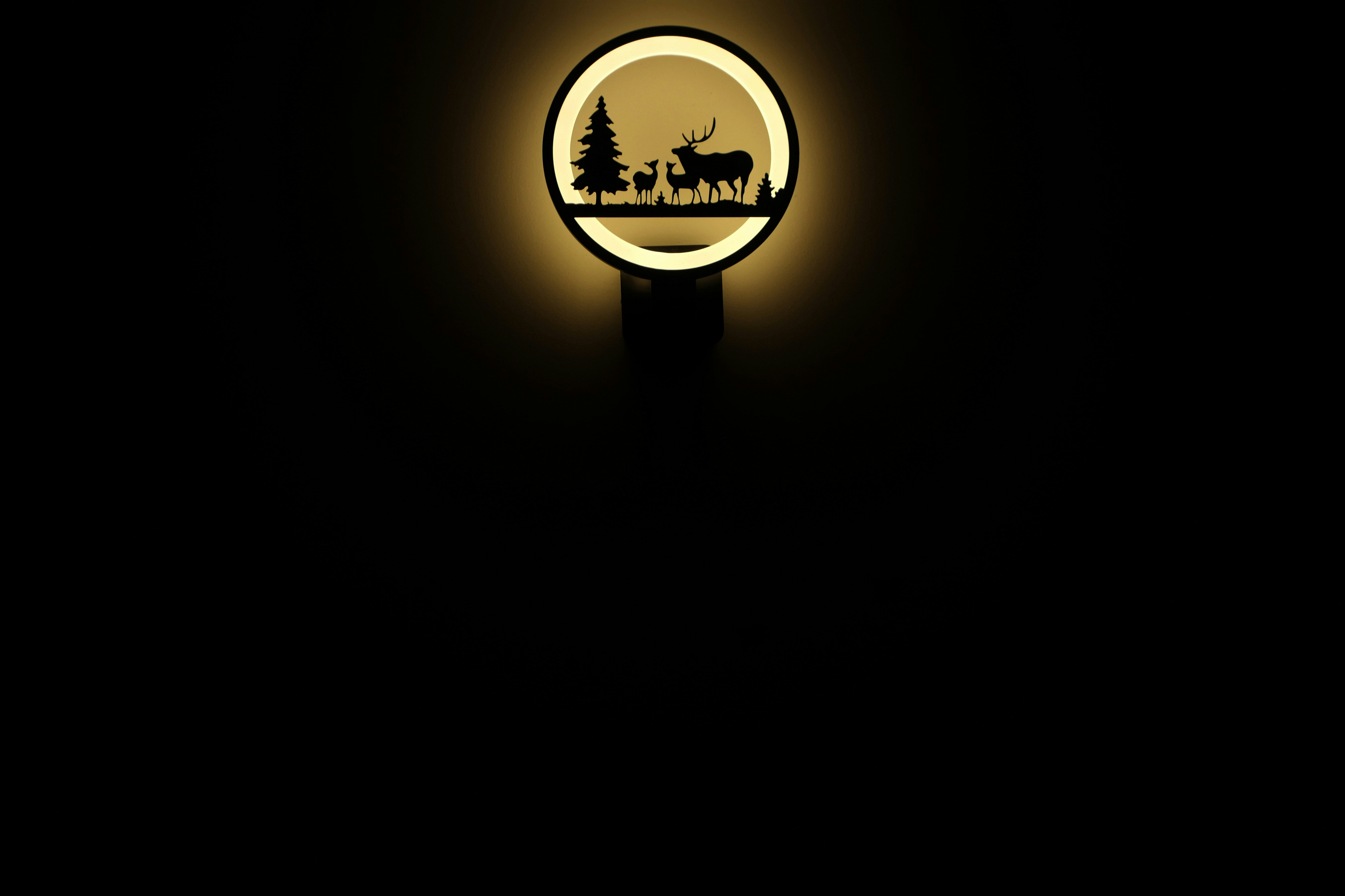 Midnight Lantern: A Silhouette Emblem Emerges in the Dark