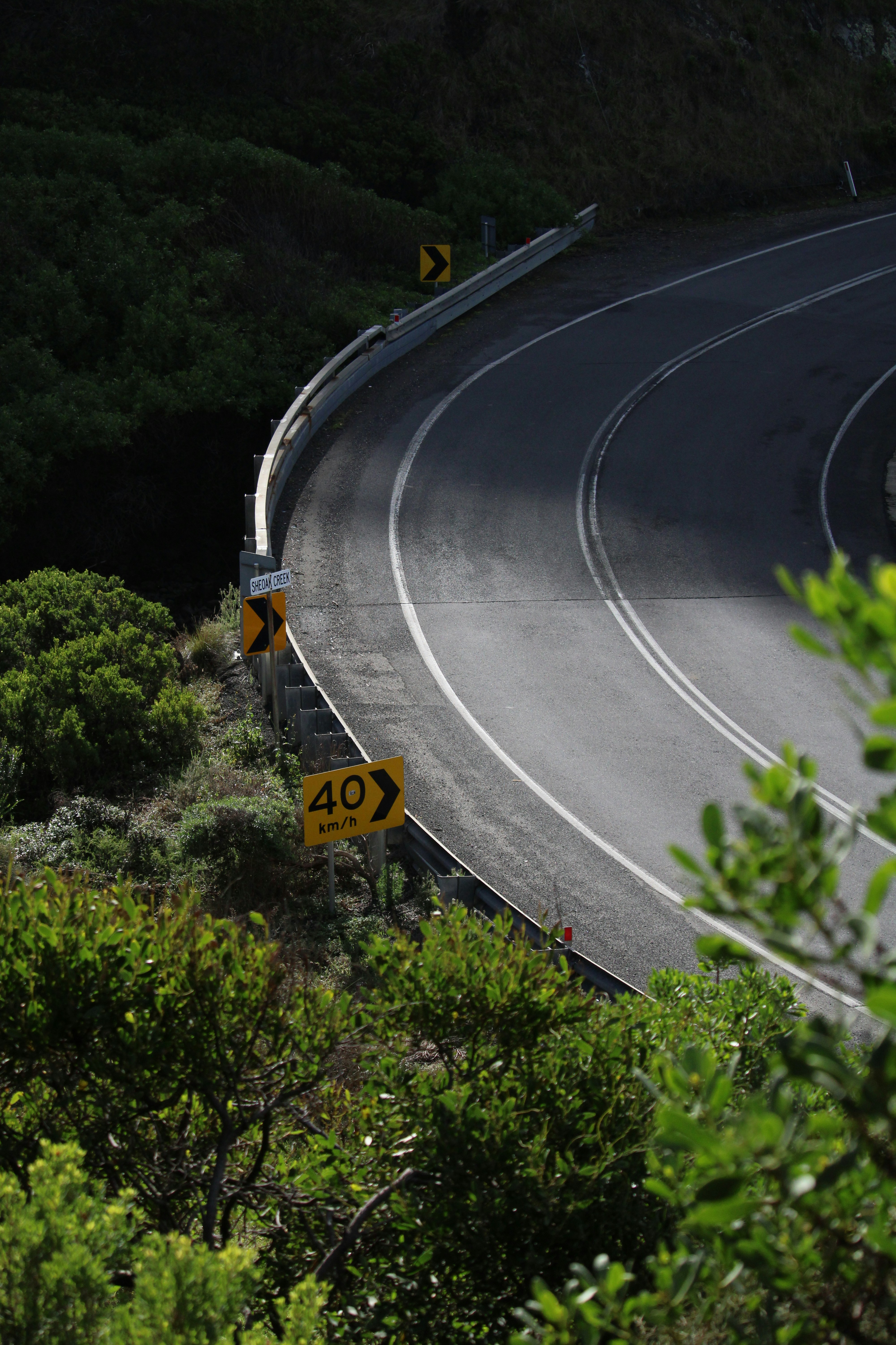 Yellow and black road sign photo – Free Road Image on Unsplash