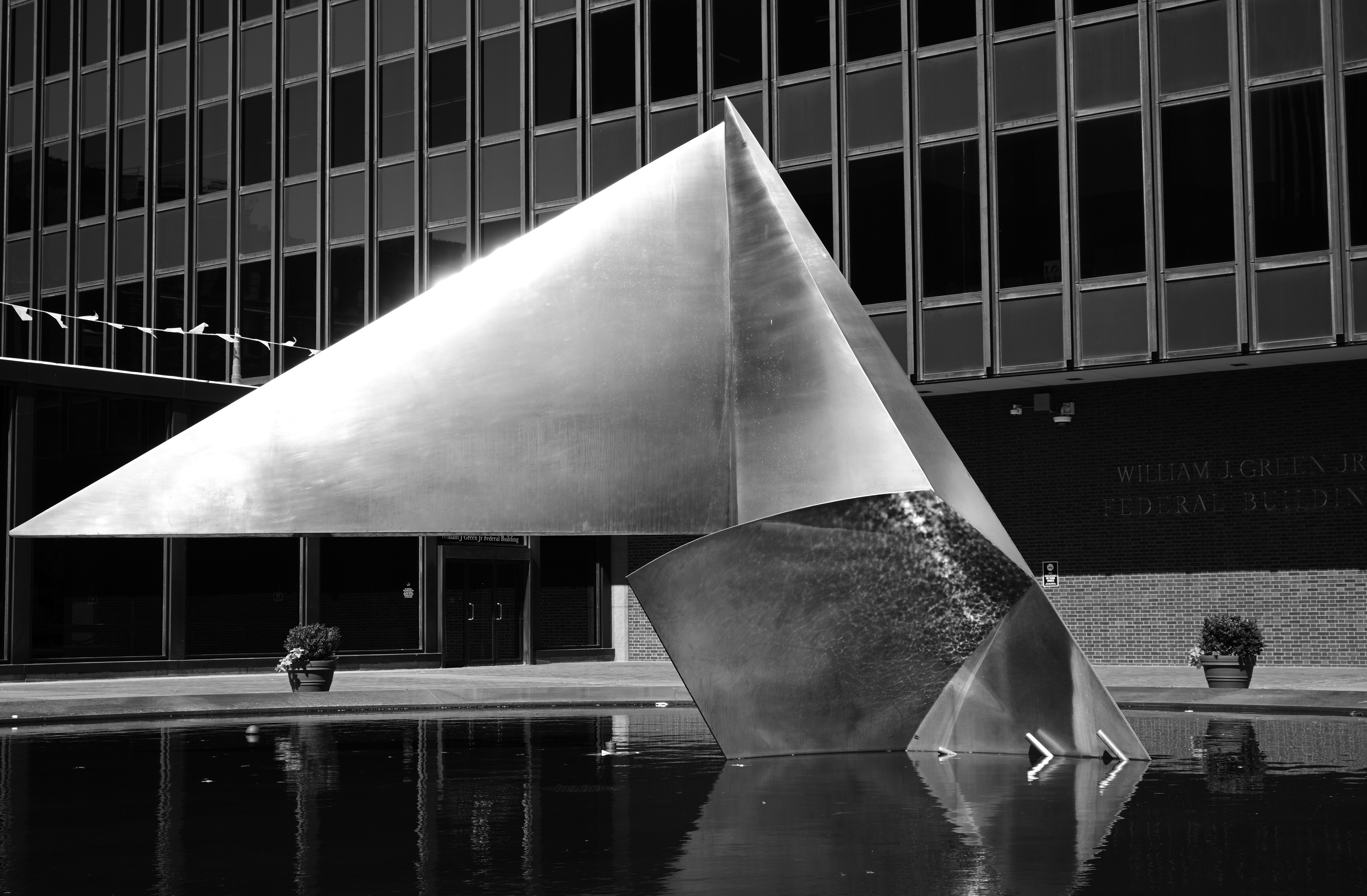 Angular Foil: The Reflective Monument in Quiet Water