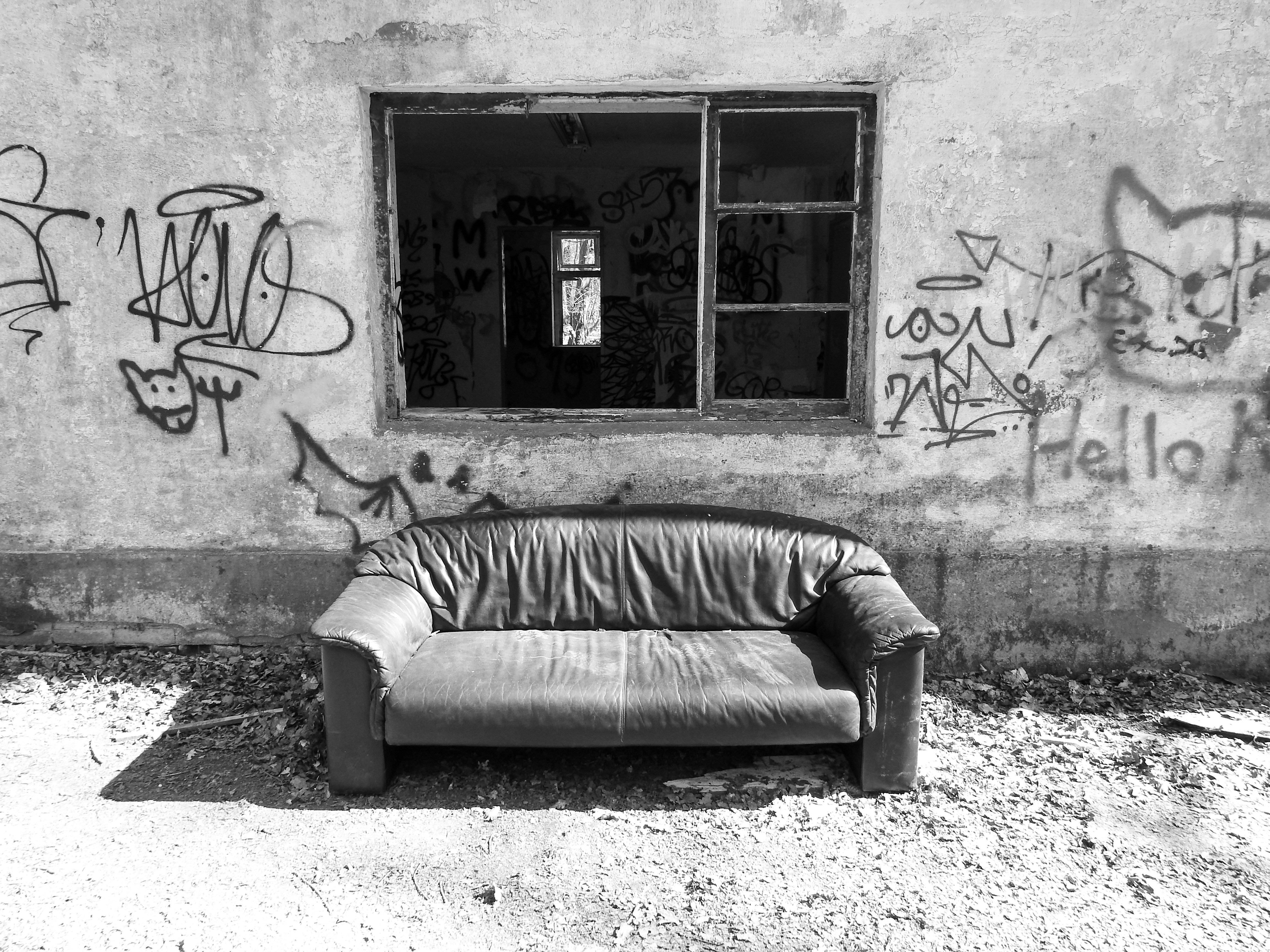Urban Solitude: A Couch in Abandonment