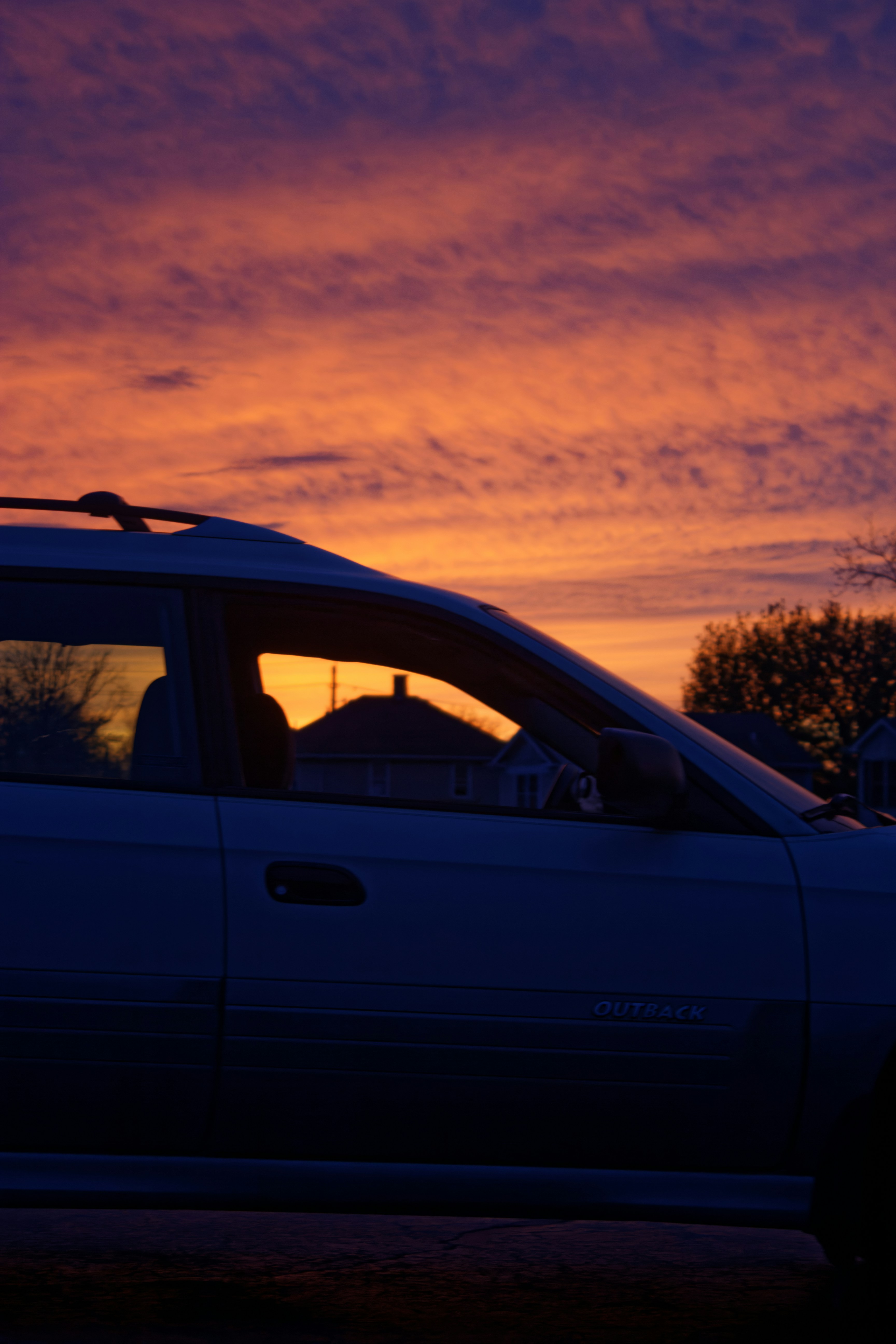 Outback at Dusk: Silhouette Against Ember Sky