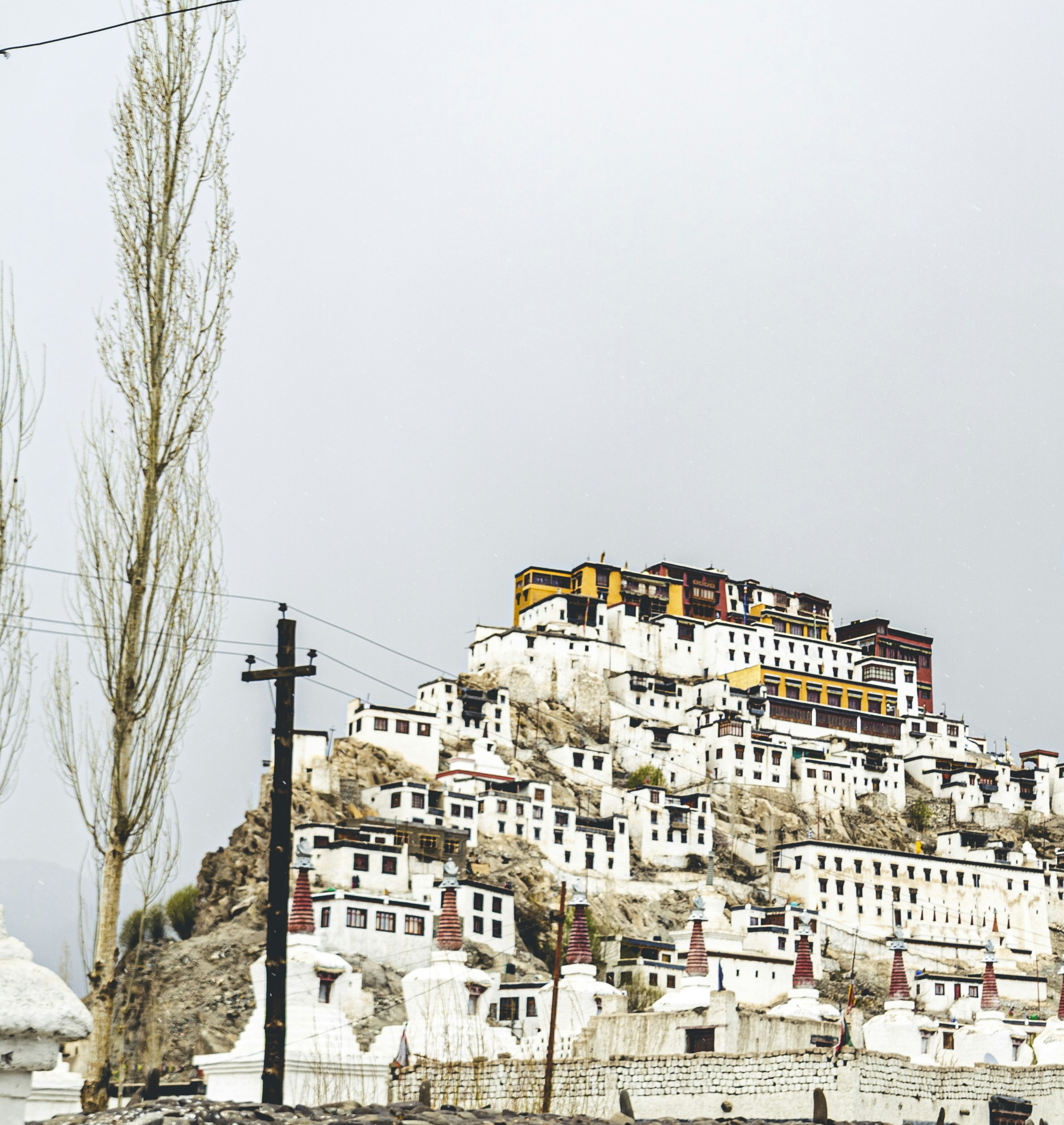 Hilltop White Town with Colorful Terrace Housing