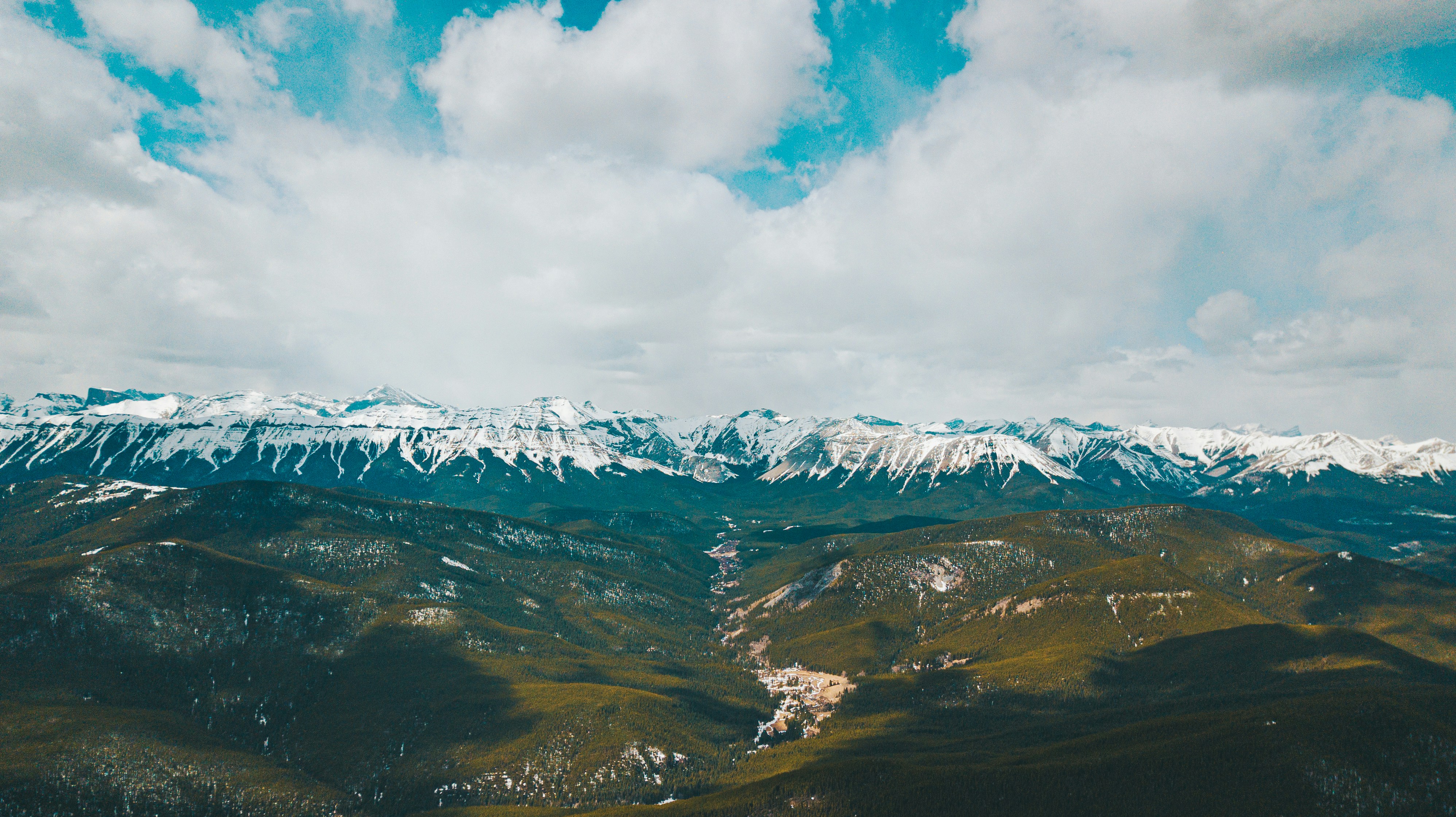 Alpine Crest: A Drone’s Eye Over Snow-Dusted Peaks