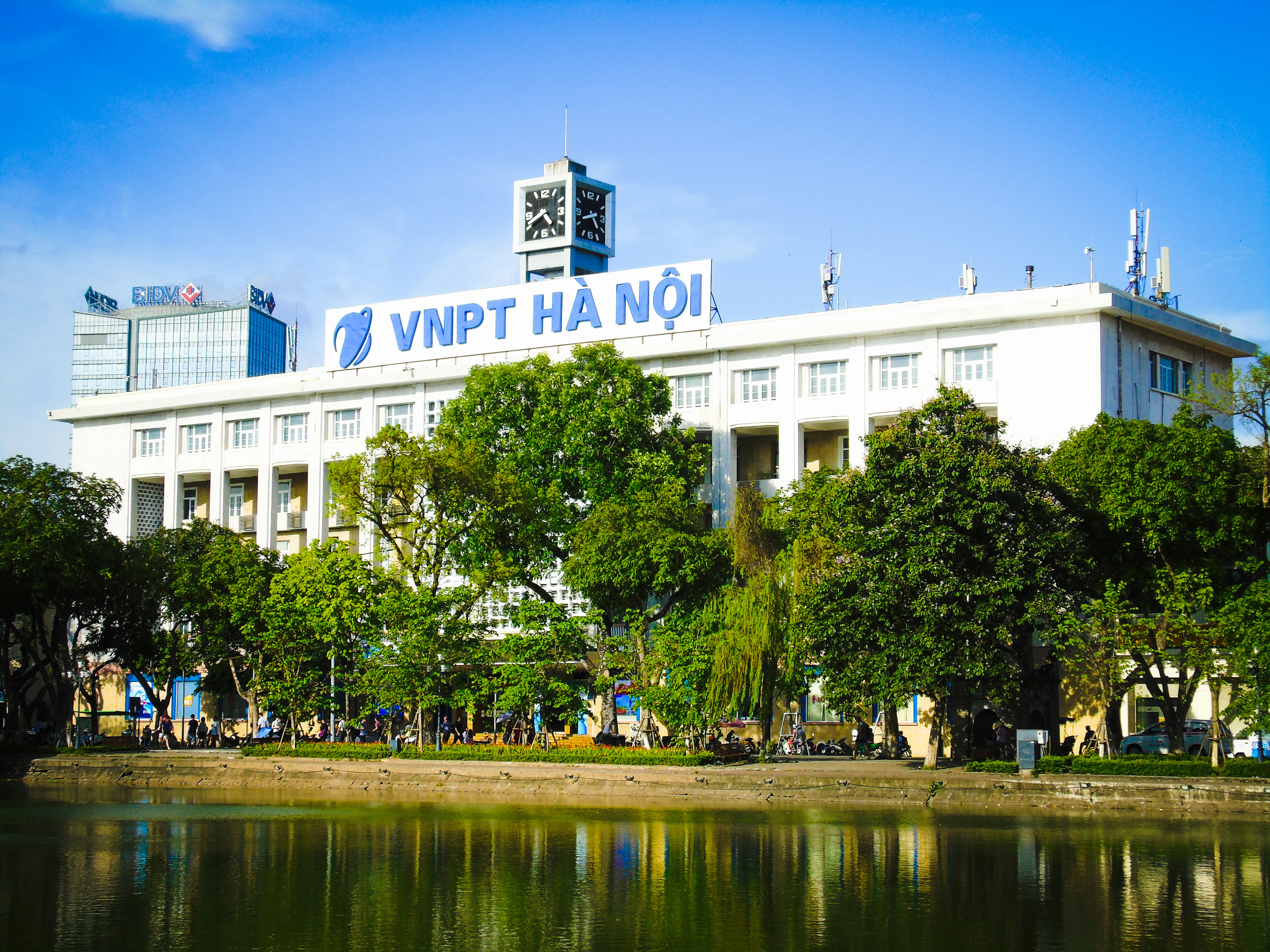 White and blue building near body of water during daytime photo – Free ...