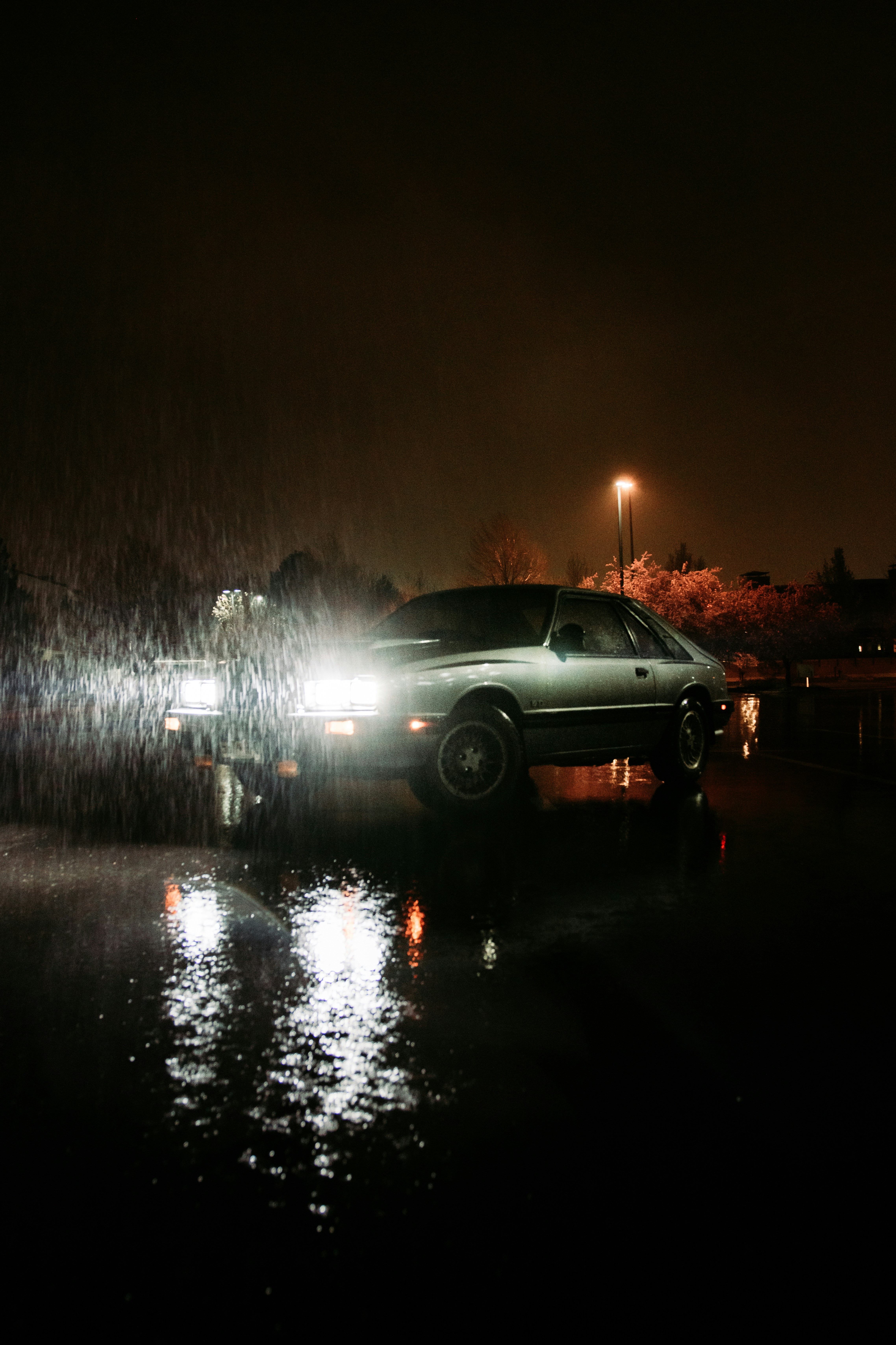 Black suv on road during night time photo – Free Light Image on Unsplash
