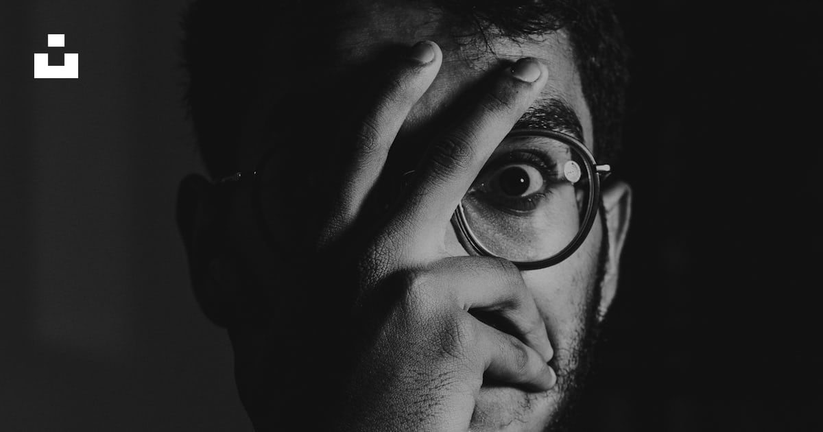 Man In Black Crew Neck Shirt Wearing Black Framed Eyeglasses Photo