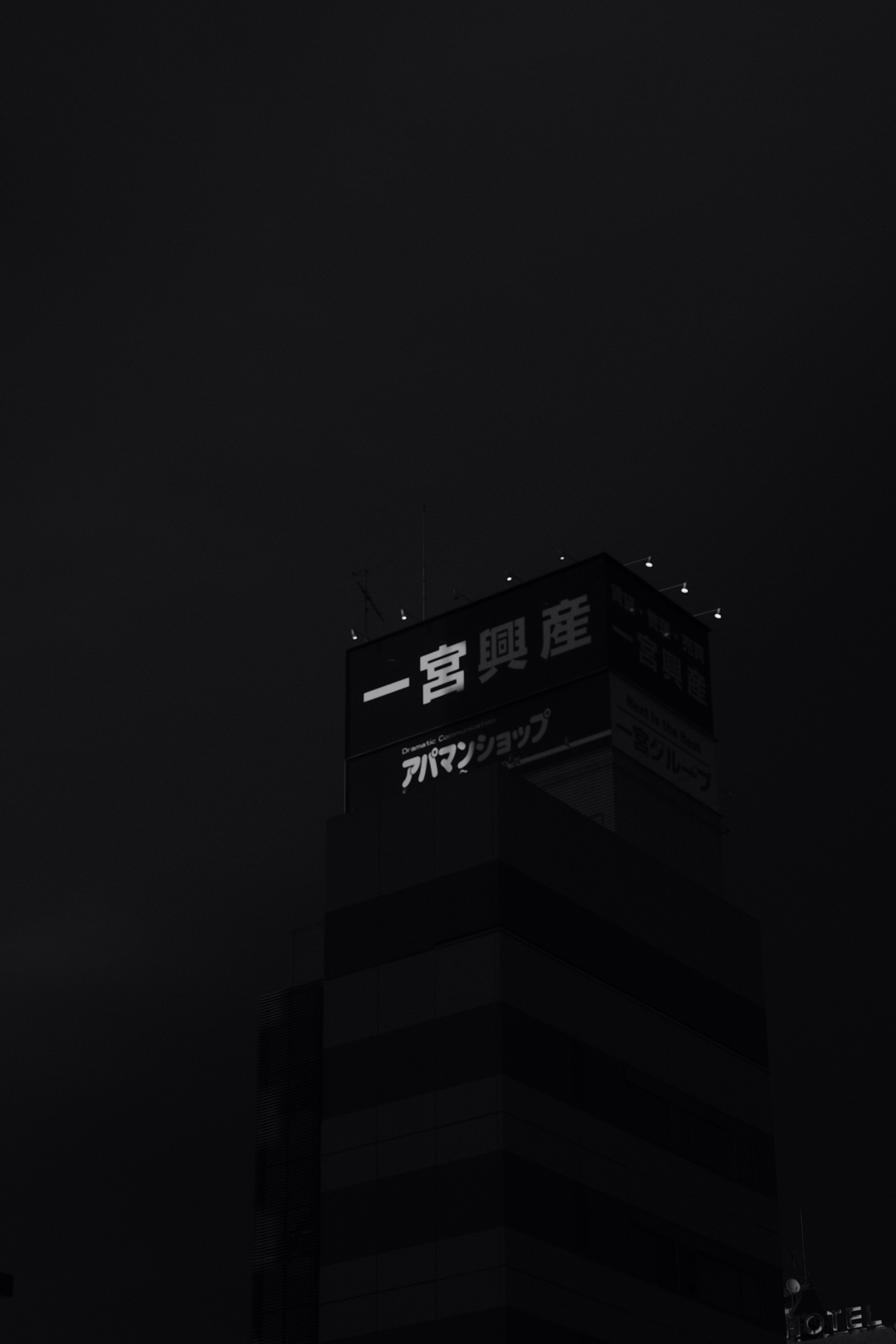 grayscale photo of high rise building
