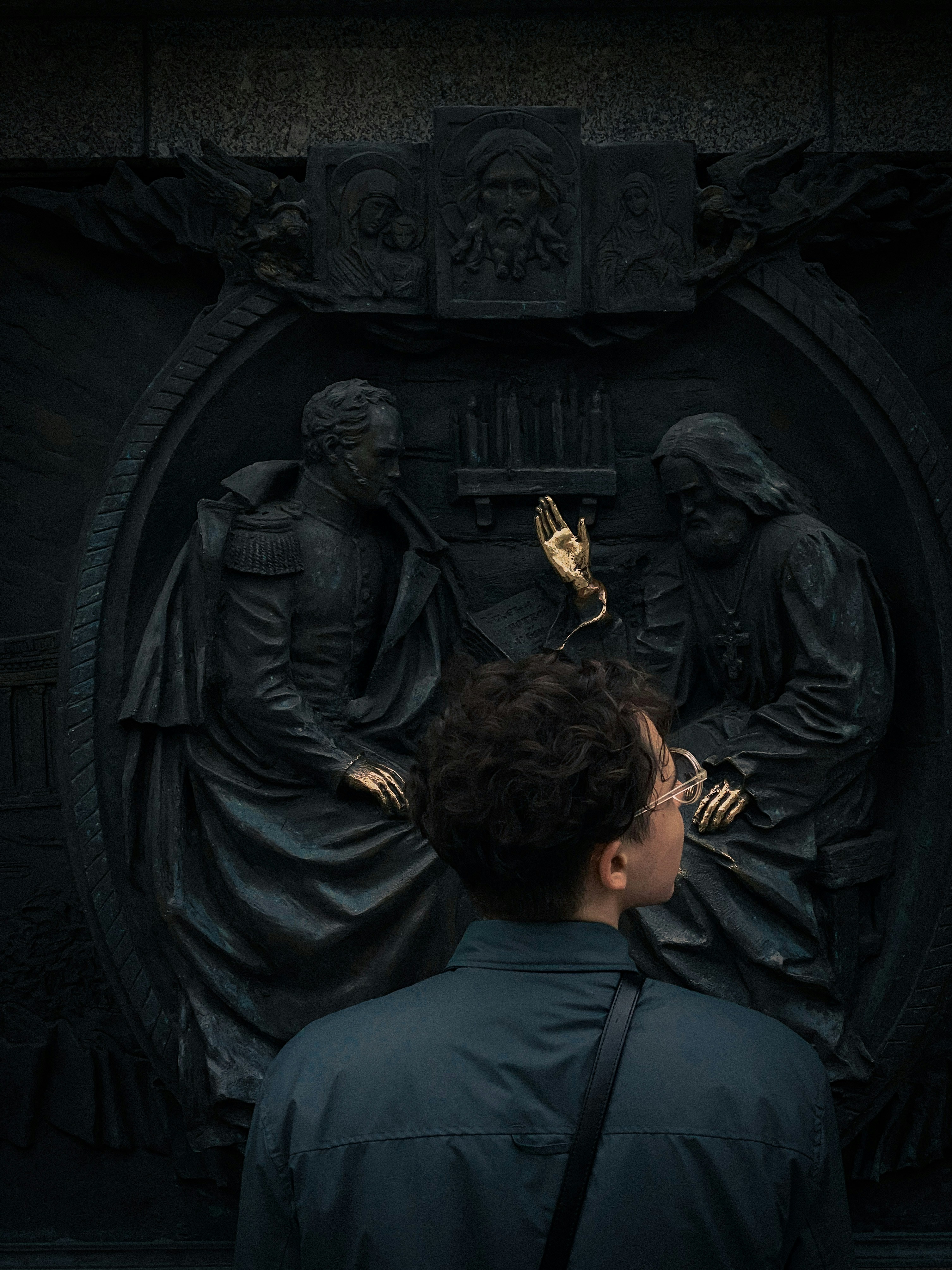 Gesture of Light: A Traveler Compares Faithful Hands in a Cathedral Relief