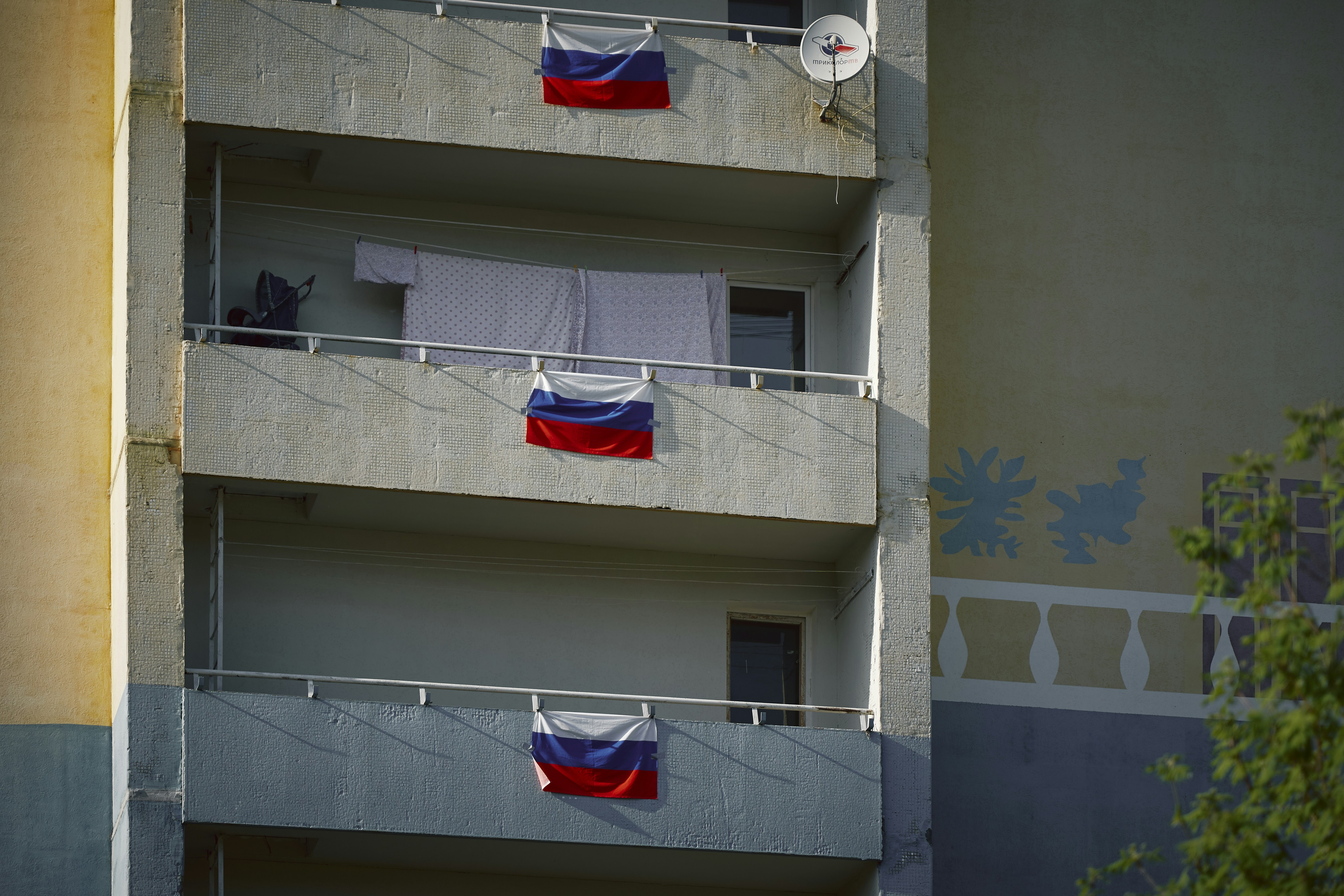 White blue and red flag on white concrete building photo – Free Grey ...