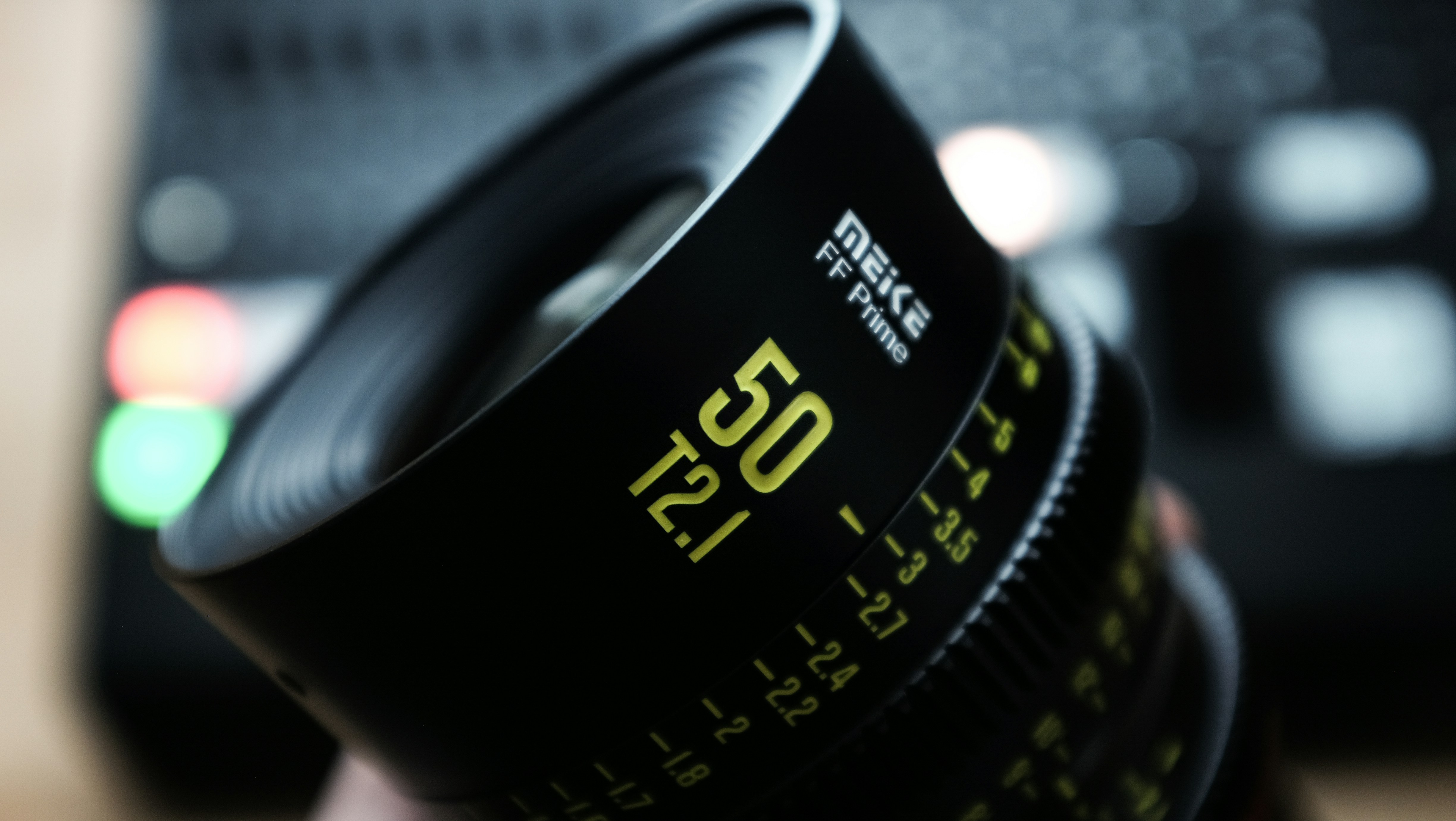 Focus Ring in Focus: Neon Blur and a Fast Prime Close-Up