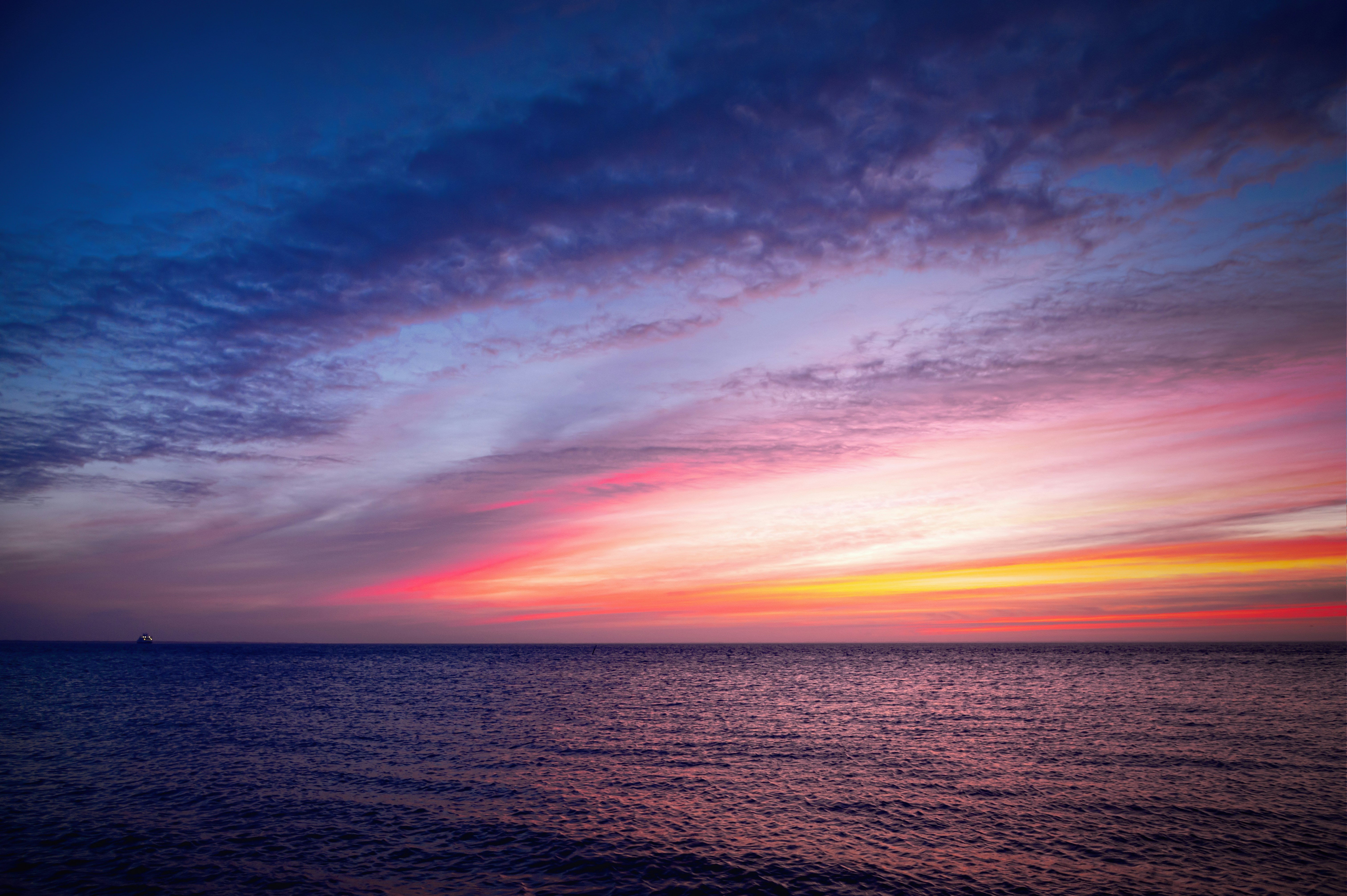 Body of water under blue sky during sunset photo – Free Sea Image on Unsplash