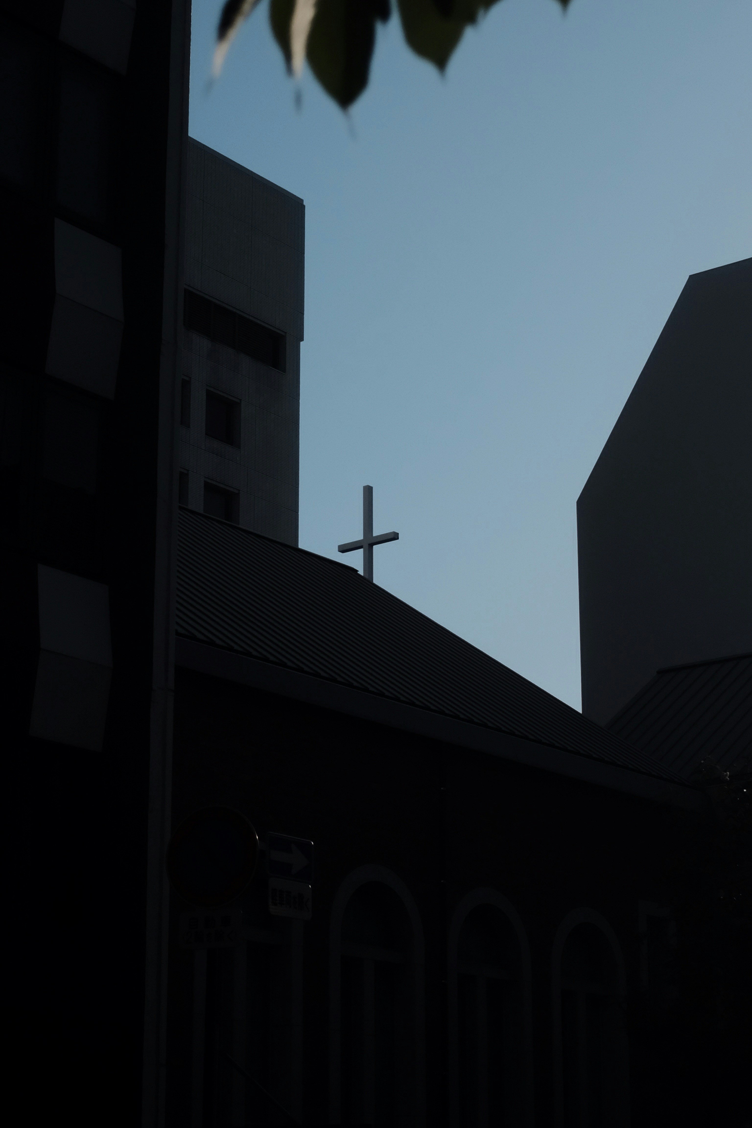 Crosslight Over the Quiet Skyline: A Moody Church Silhouette
