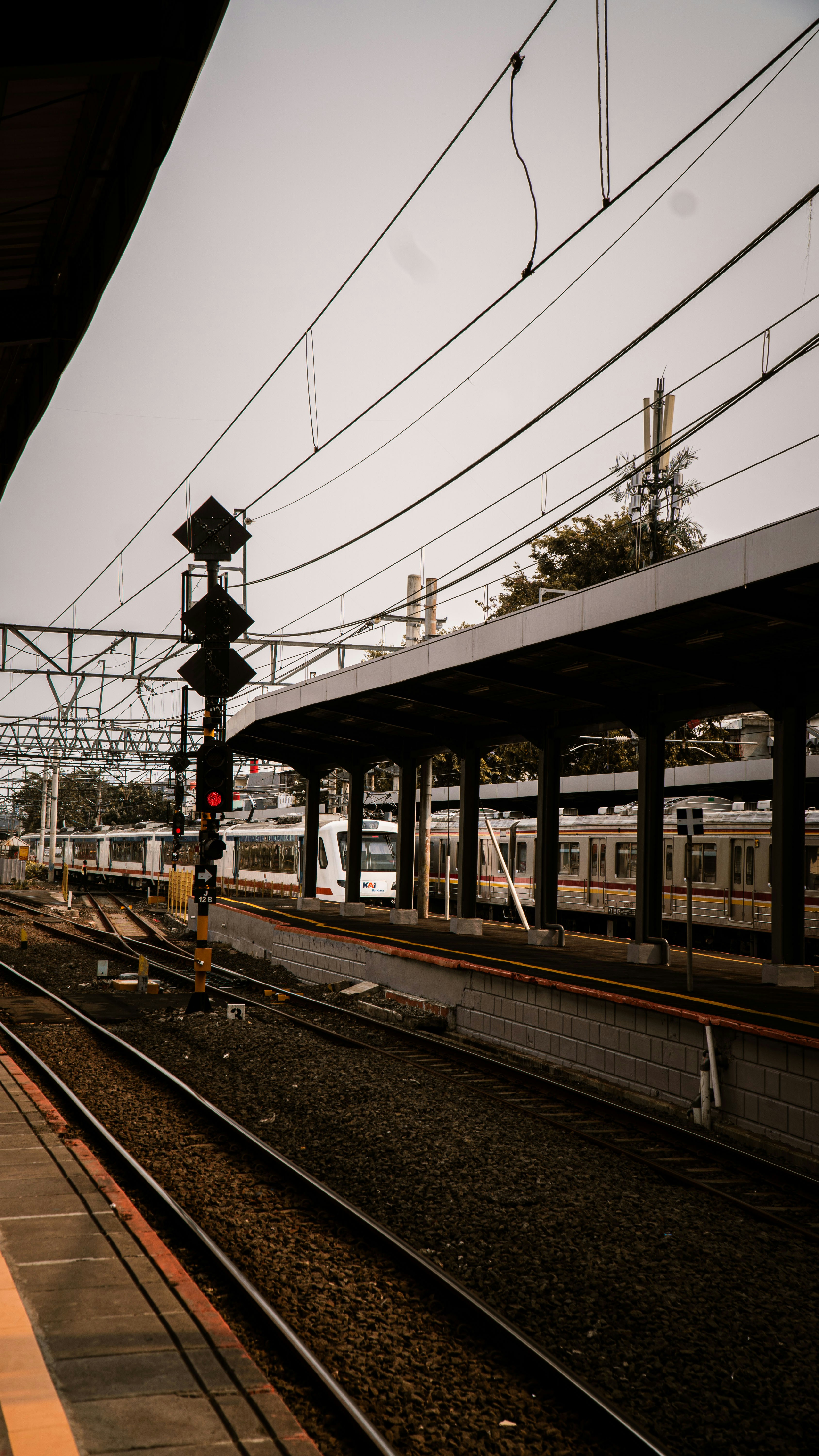 Train rail under bridge during daytime photo – Free North duri Image on ...