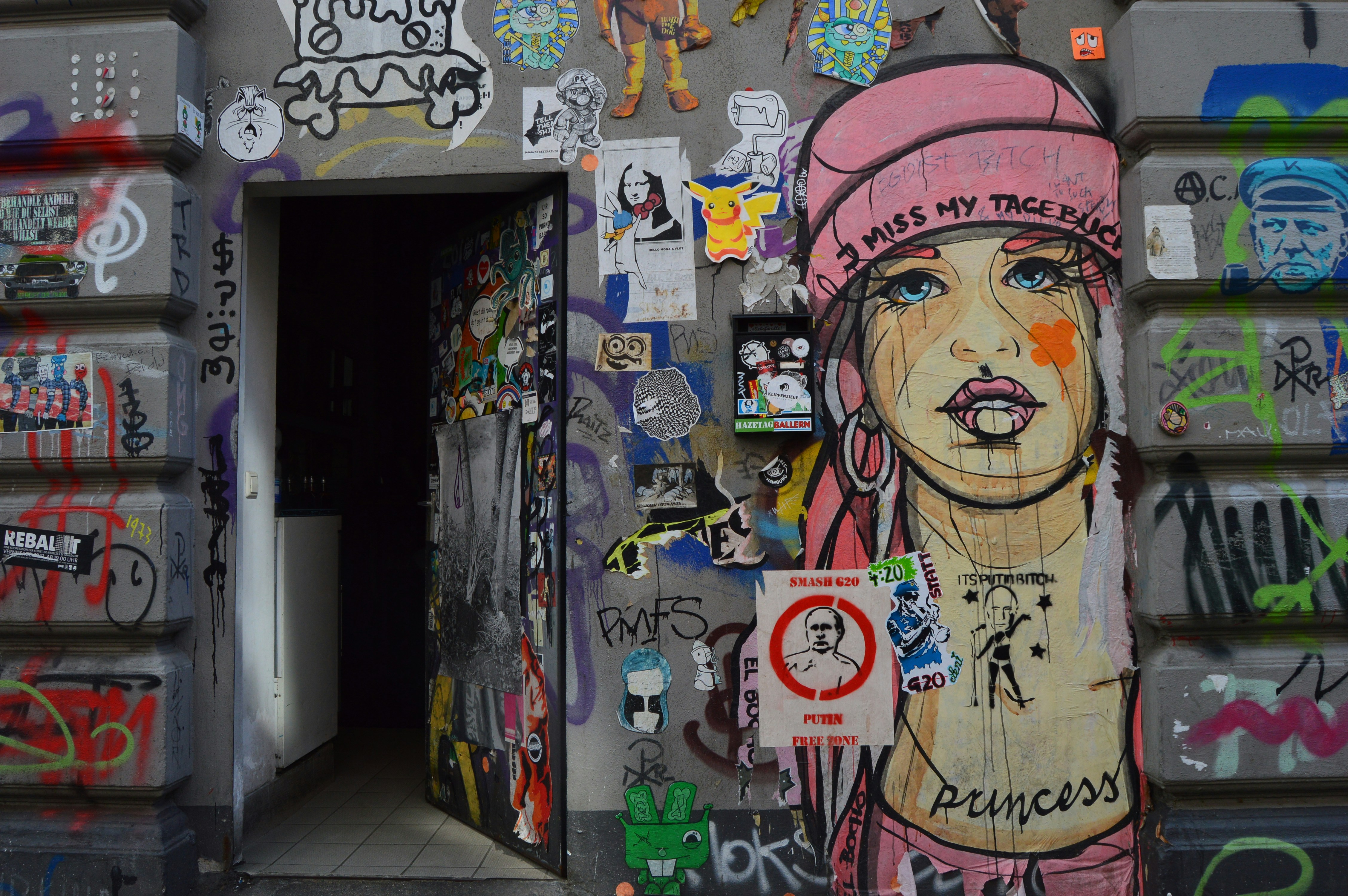 Princess in Pink: A Graffiti Portrait Dominating a Wall of Street Art