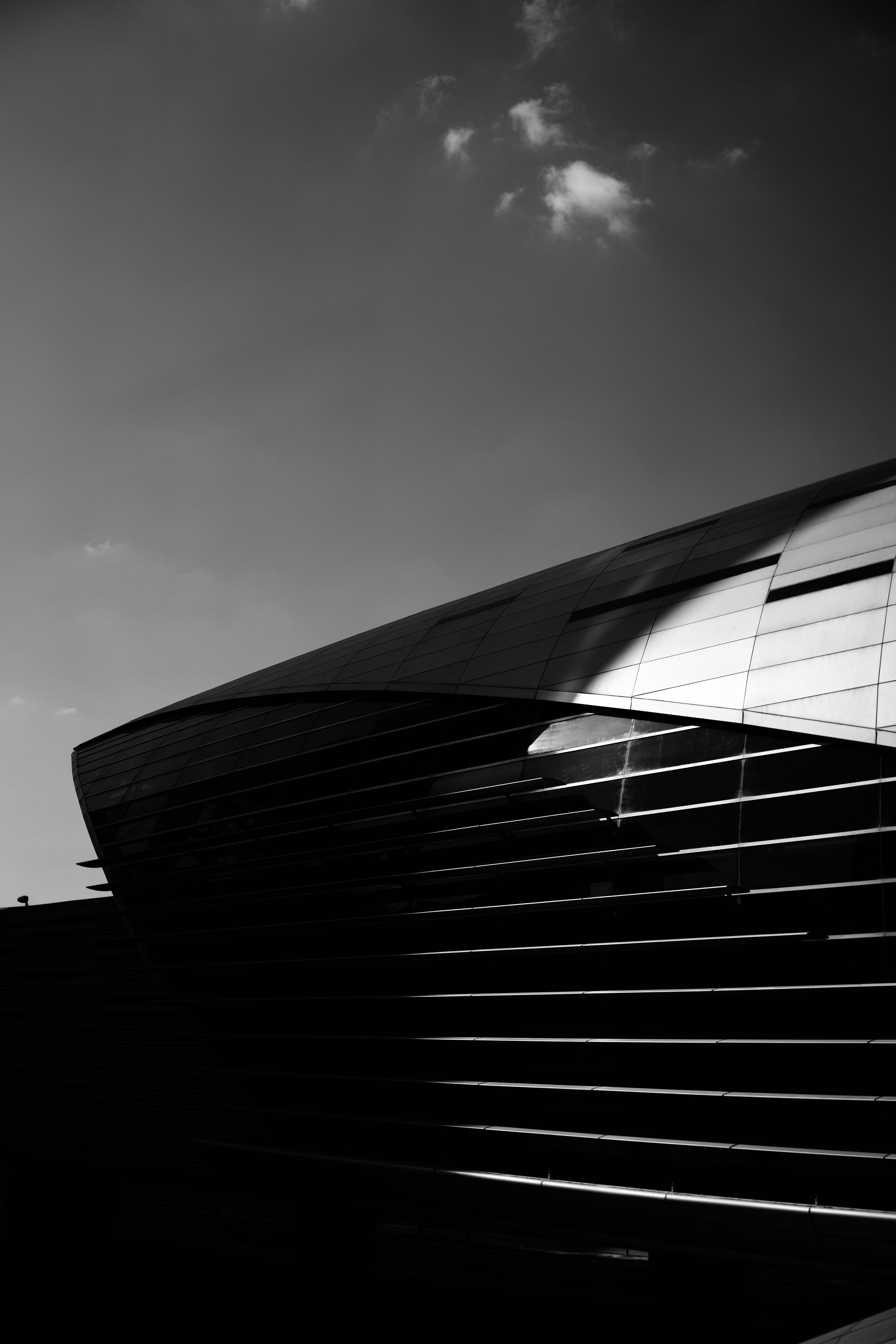 Grayscale photo of glass building photo – Free Grey Image on Unsplash