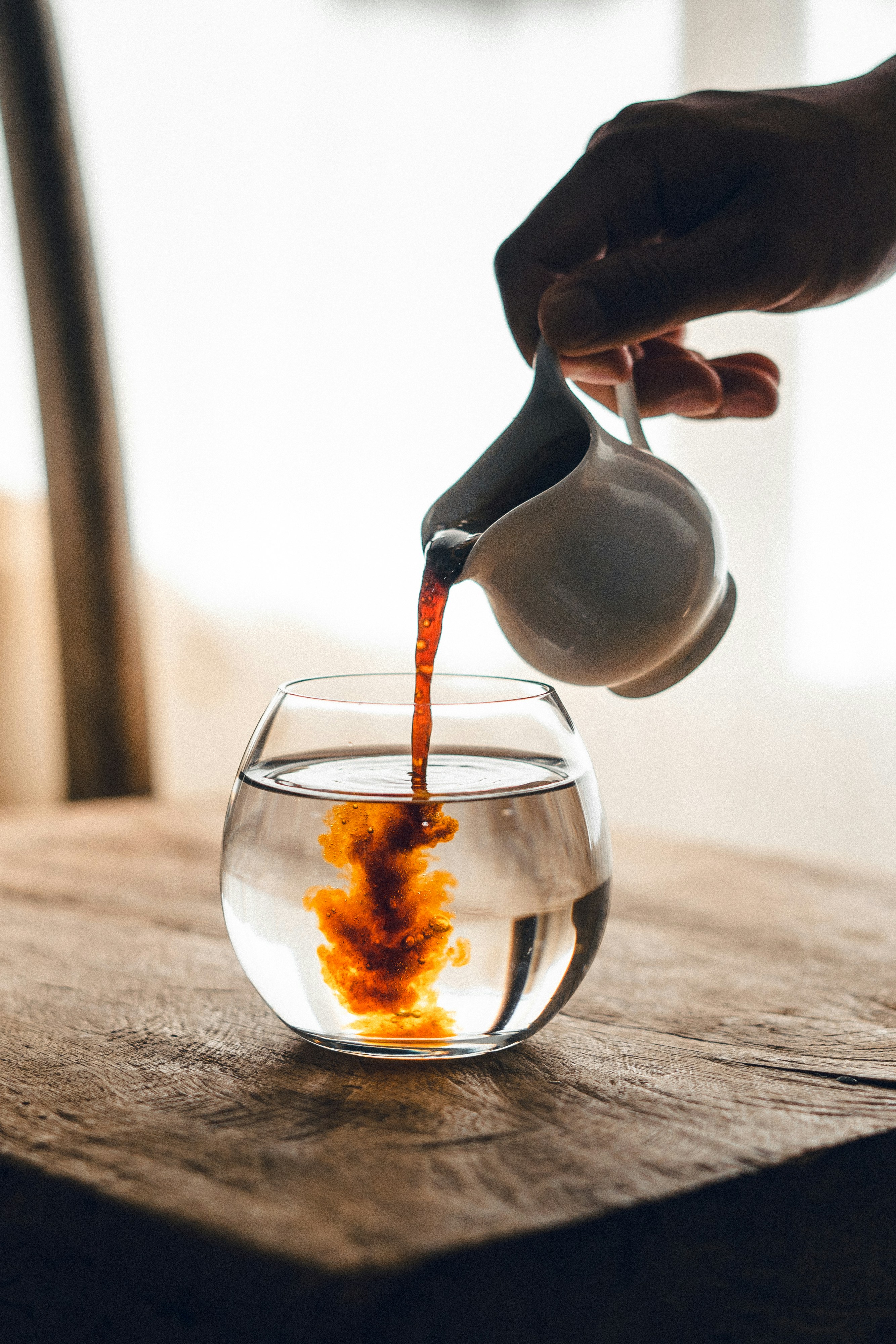 Crimson Plume: A Quiet Pour Turns Water into Color