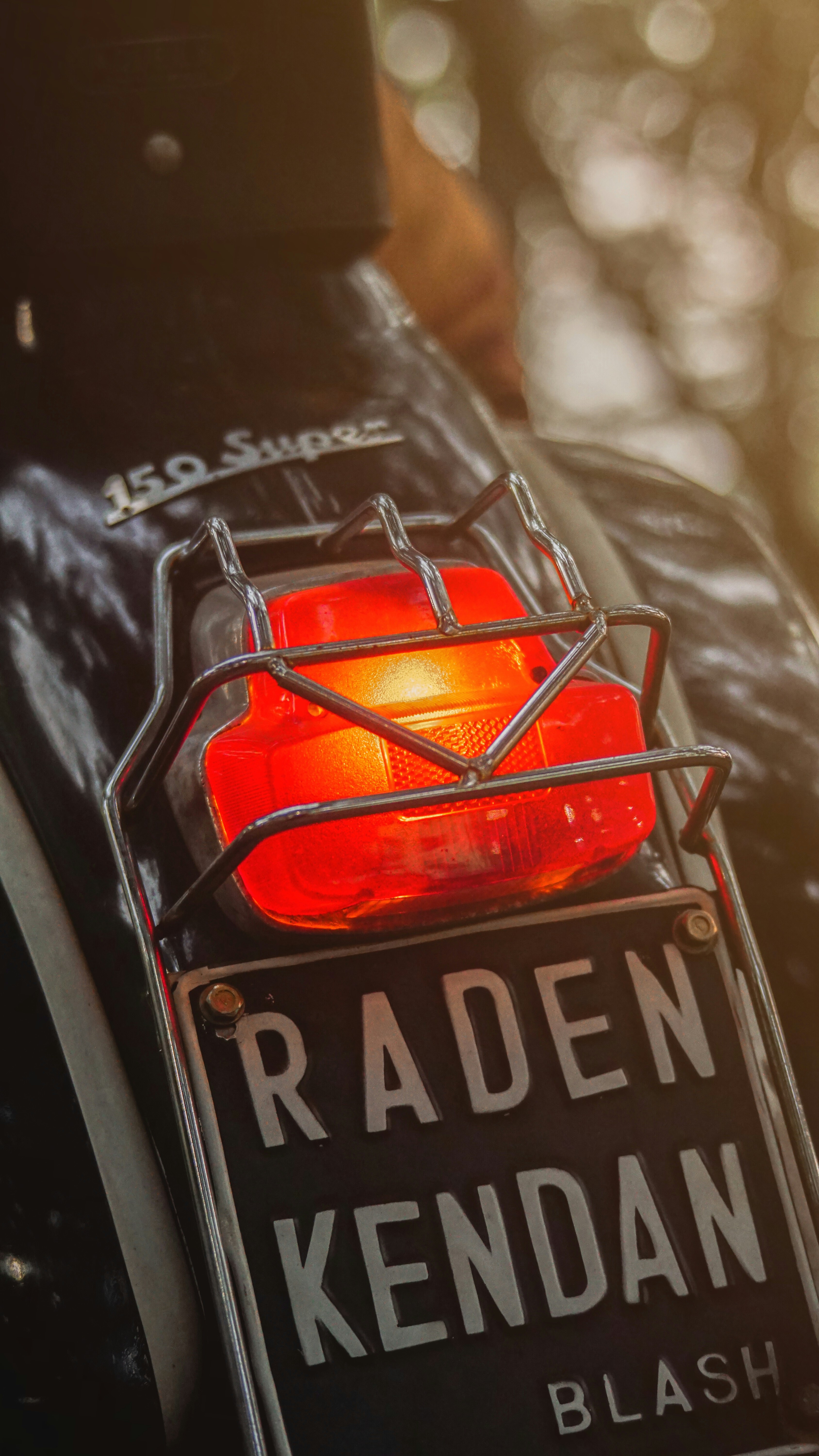 A close up of a red light on a motorcycle photo – Free Light Image on ...