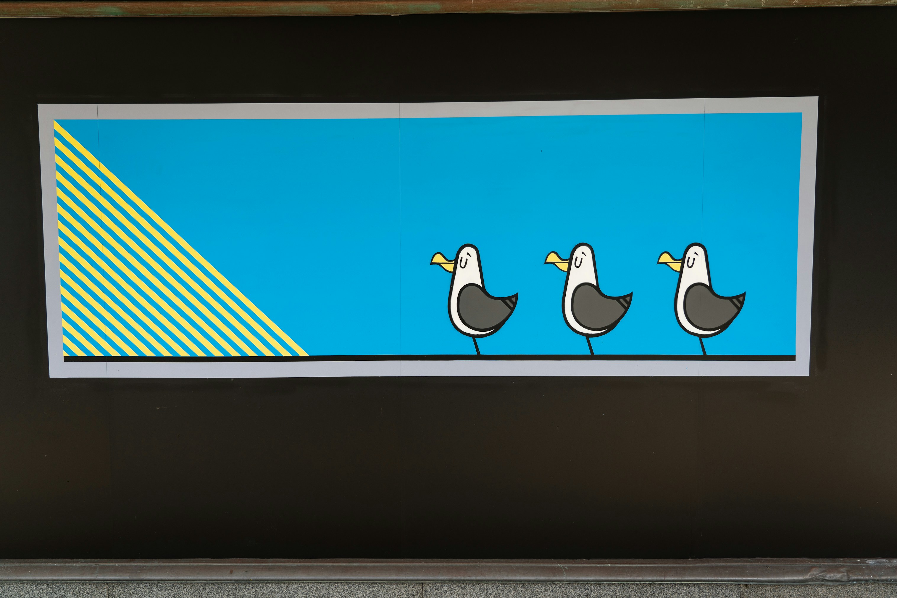 Blue Panel Parade: Three Seagulls Against a Chevron Dawn