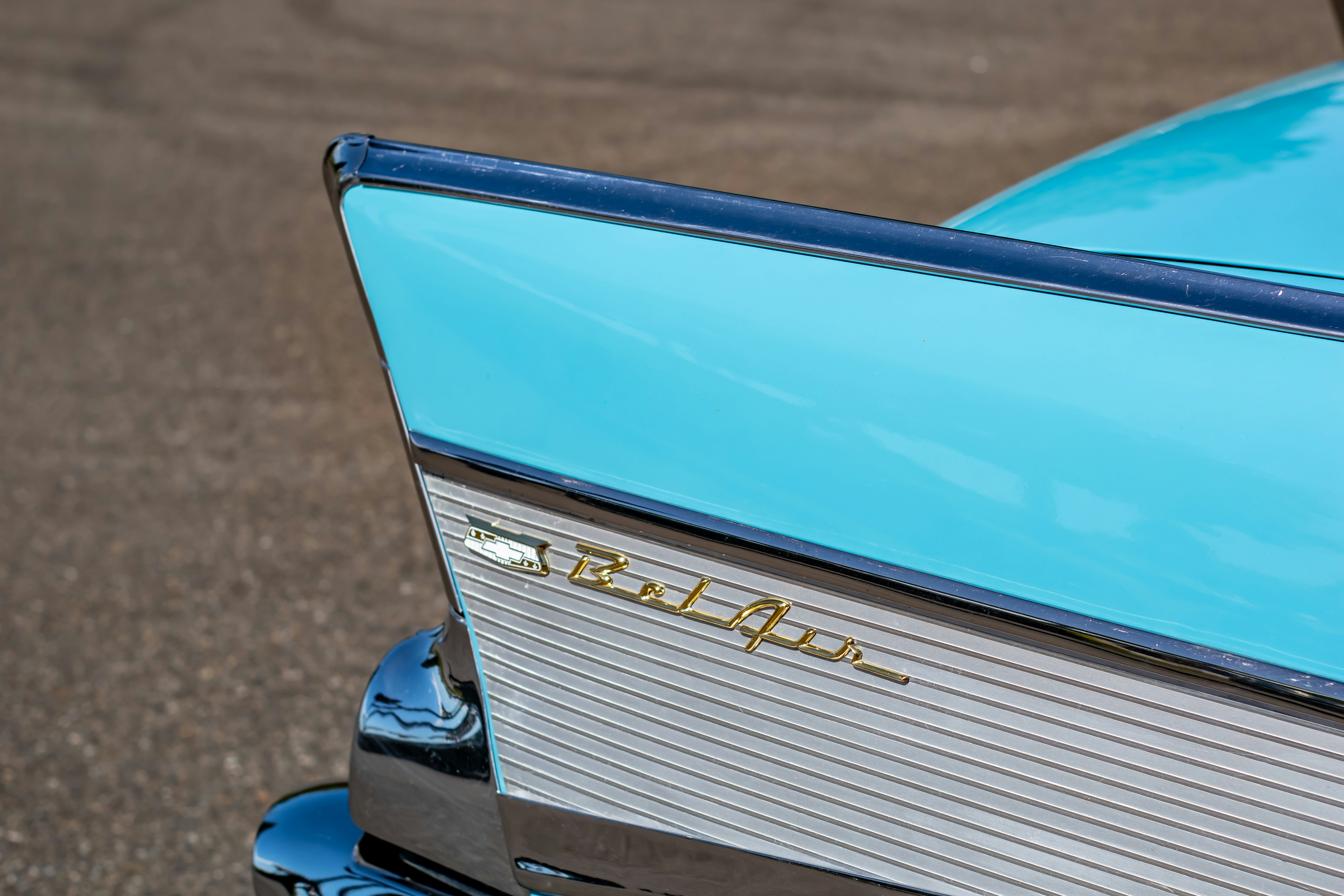 Teal Chrome Moment: The Fairlane Badge on a Vintage Grille