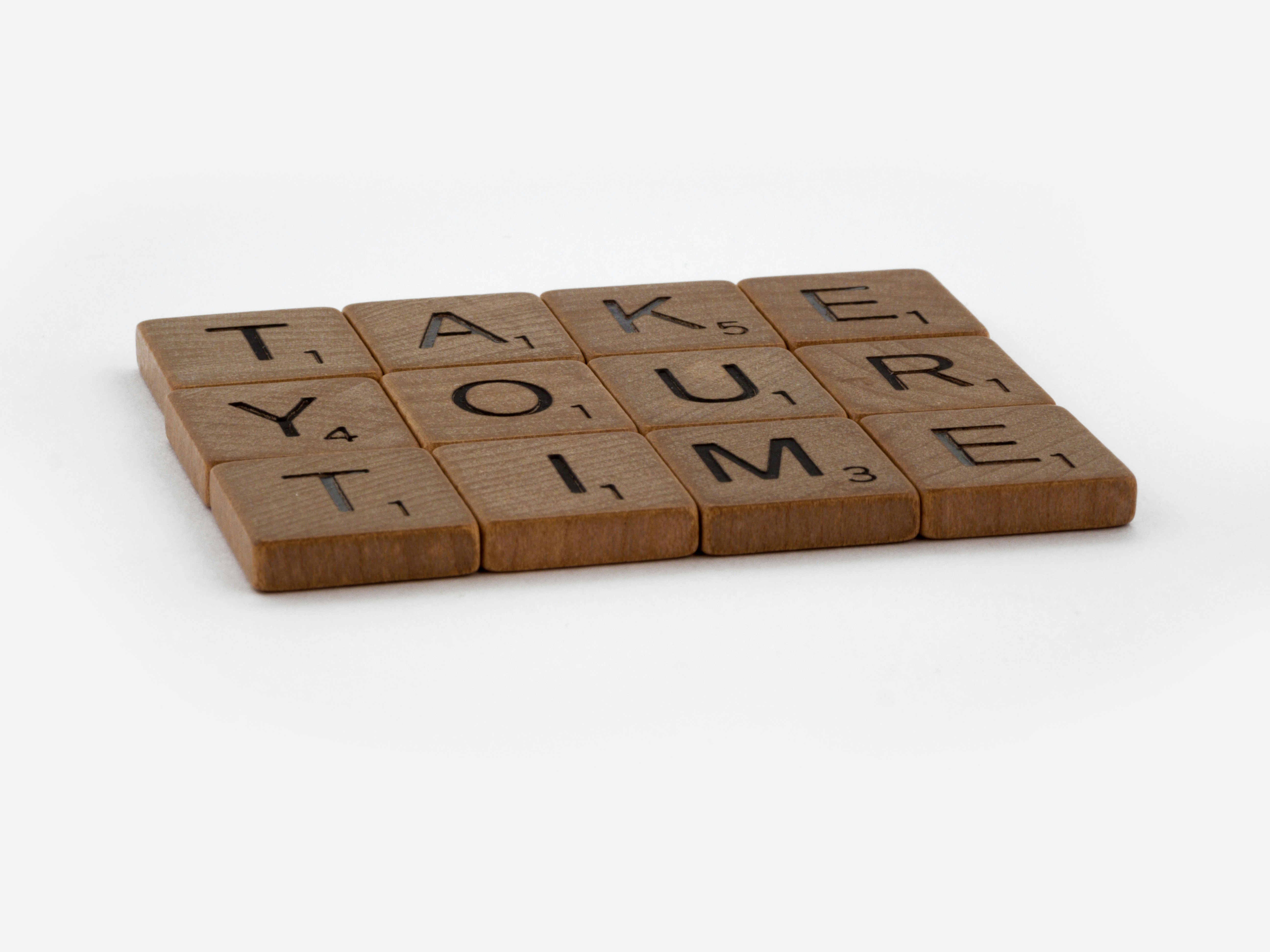 Time Tiles on White: A Minimalist Scrabble Still Life
