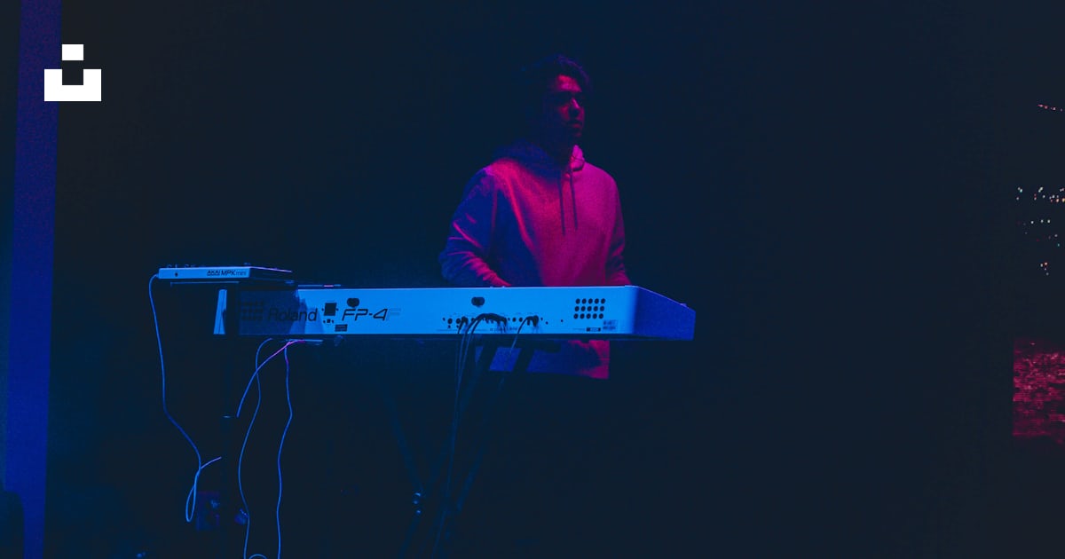 Man In Red Dress Shirt Playing Electric Guitar Photo Free Piano Image