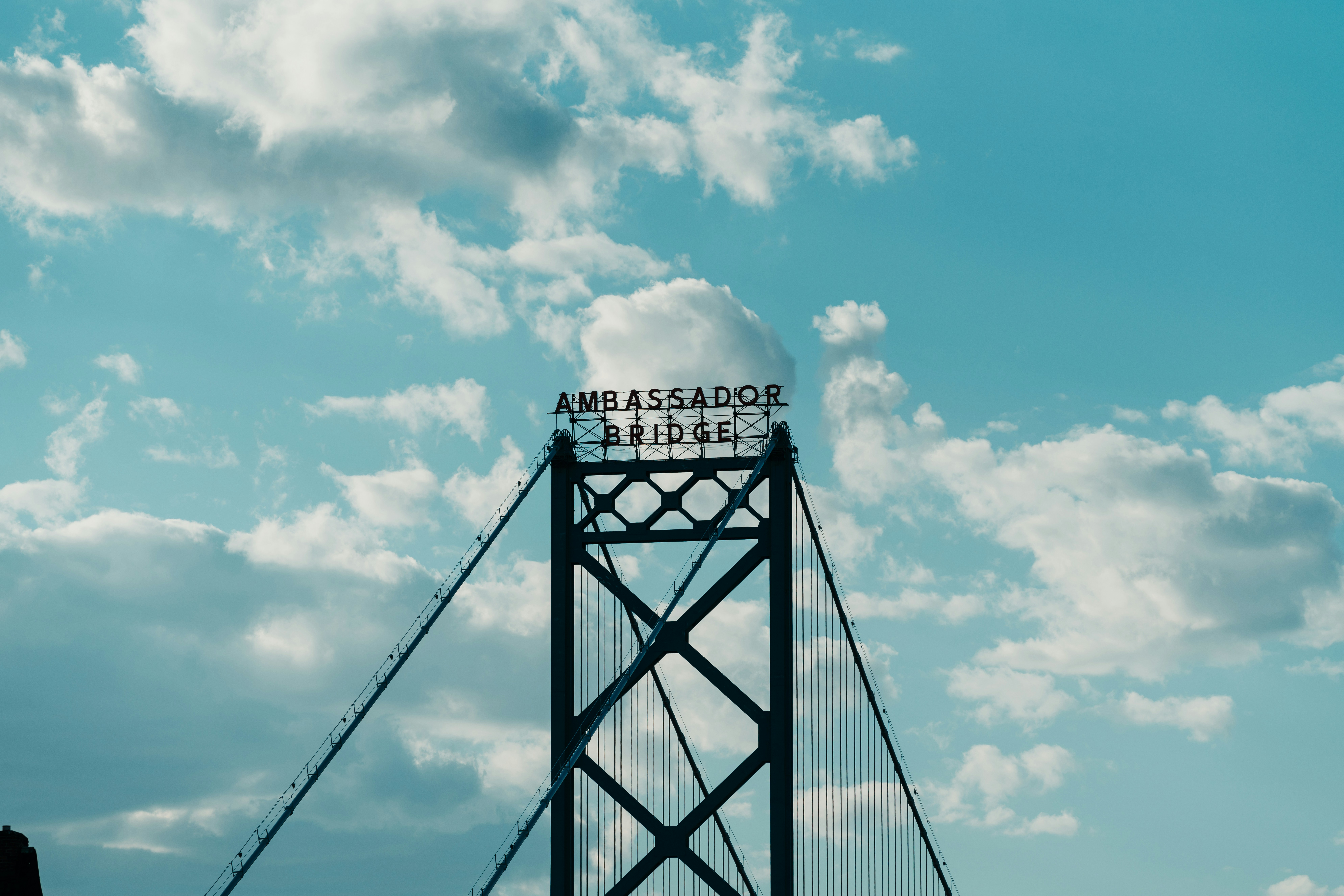Skybound Lattice: Ambassador Bridge Tower against a cerulean sky