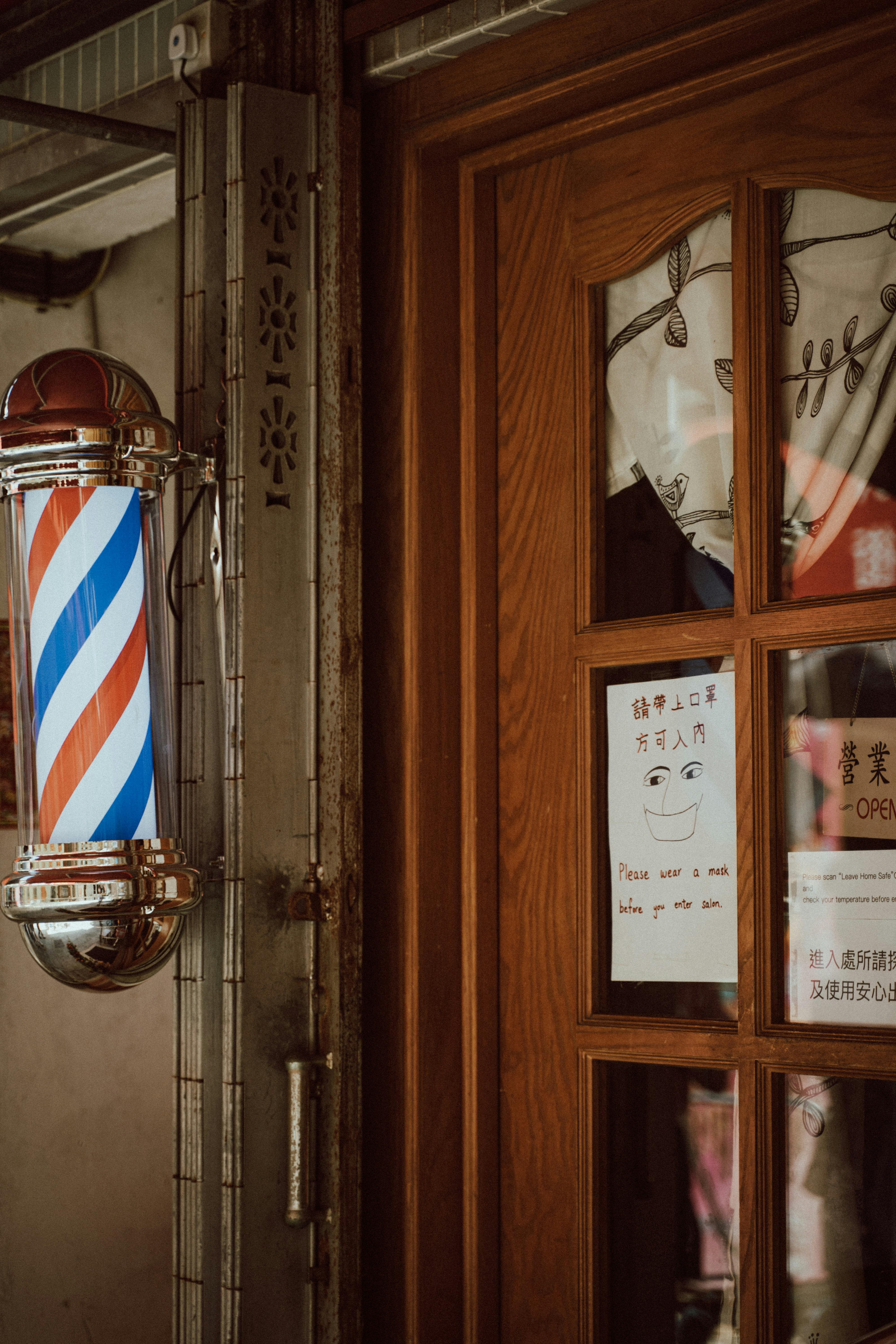 Barber Shop Signage and Striped Classic in Quiet Alley