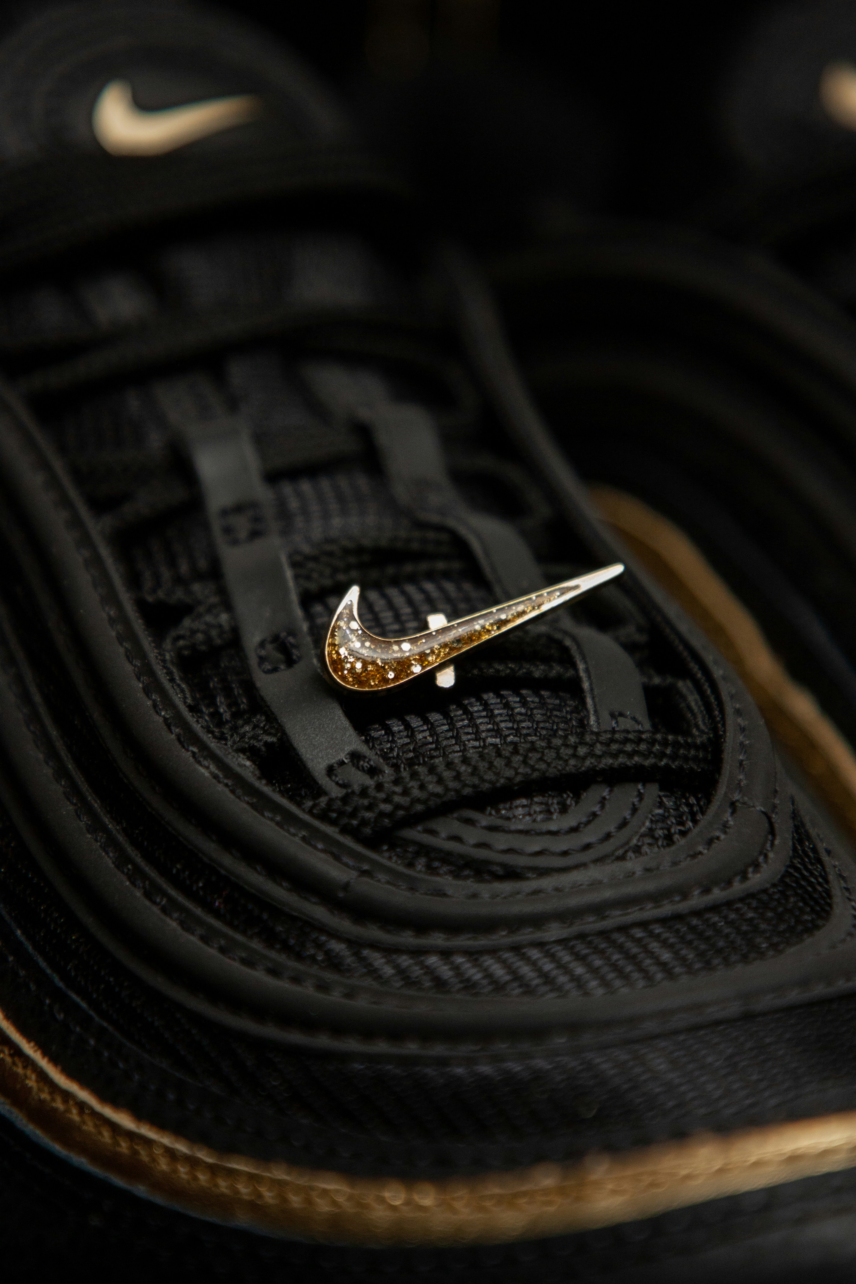 gold leaf on black leather bag