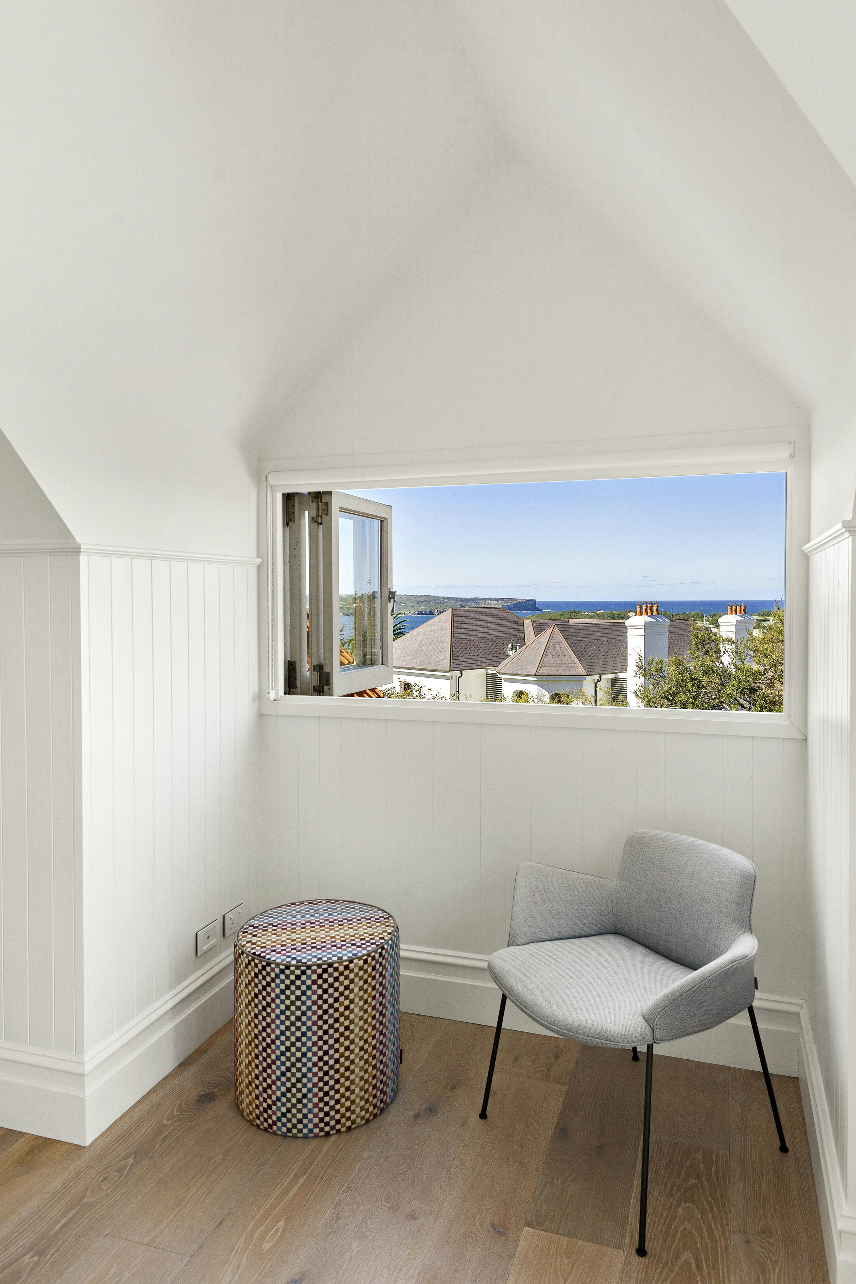 Windowed Sea View: A Quiet Nook Framing the Horizon