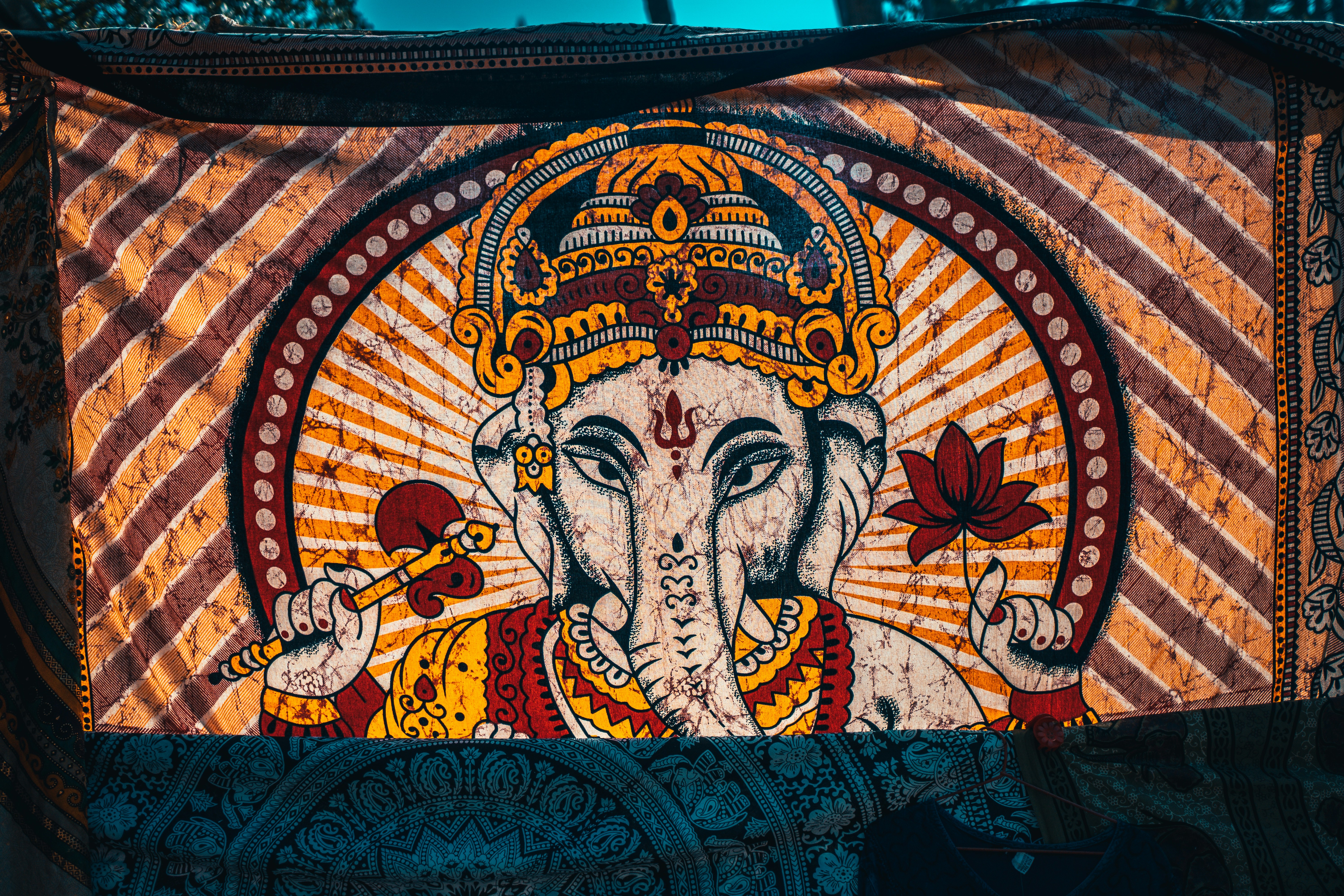 Ganesha Banner: Radiant Textile Portrait of the Elephant God