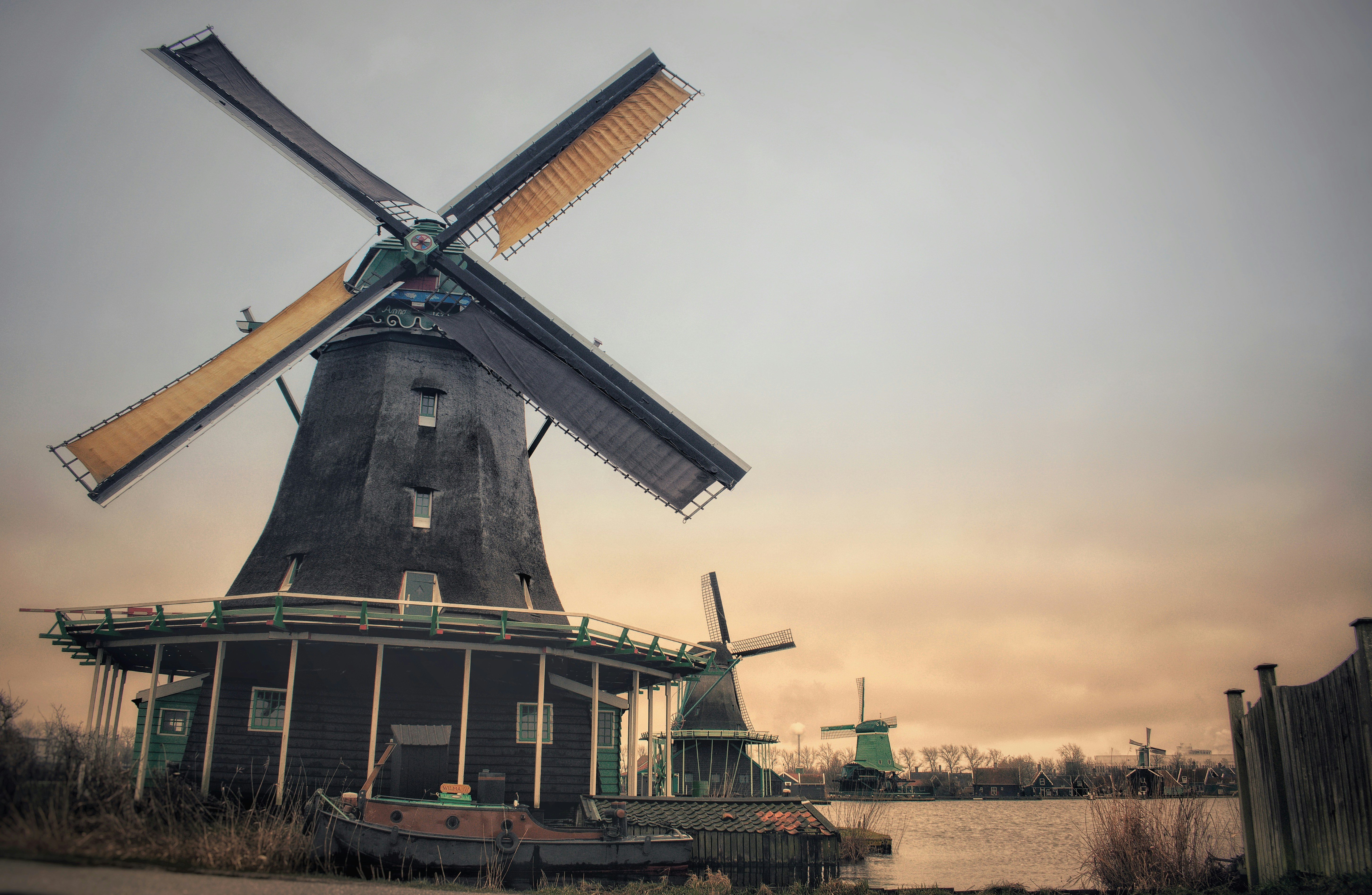 Brown windmill under gray sky during daytime photo – Free The ...