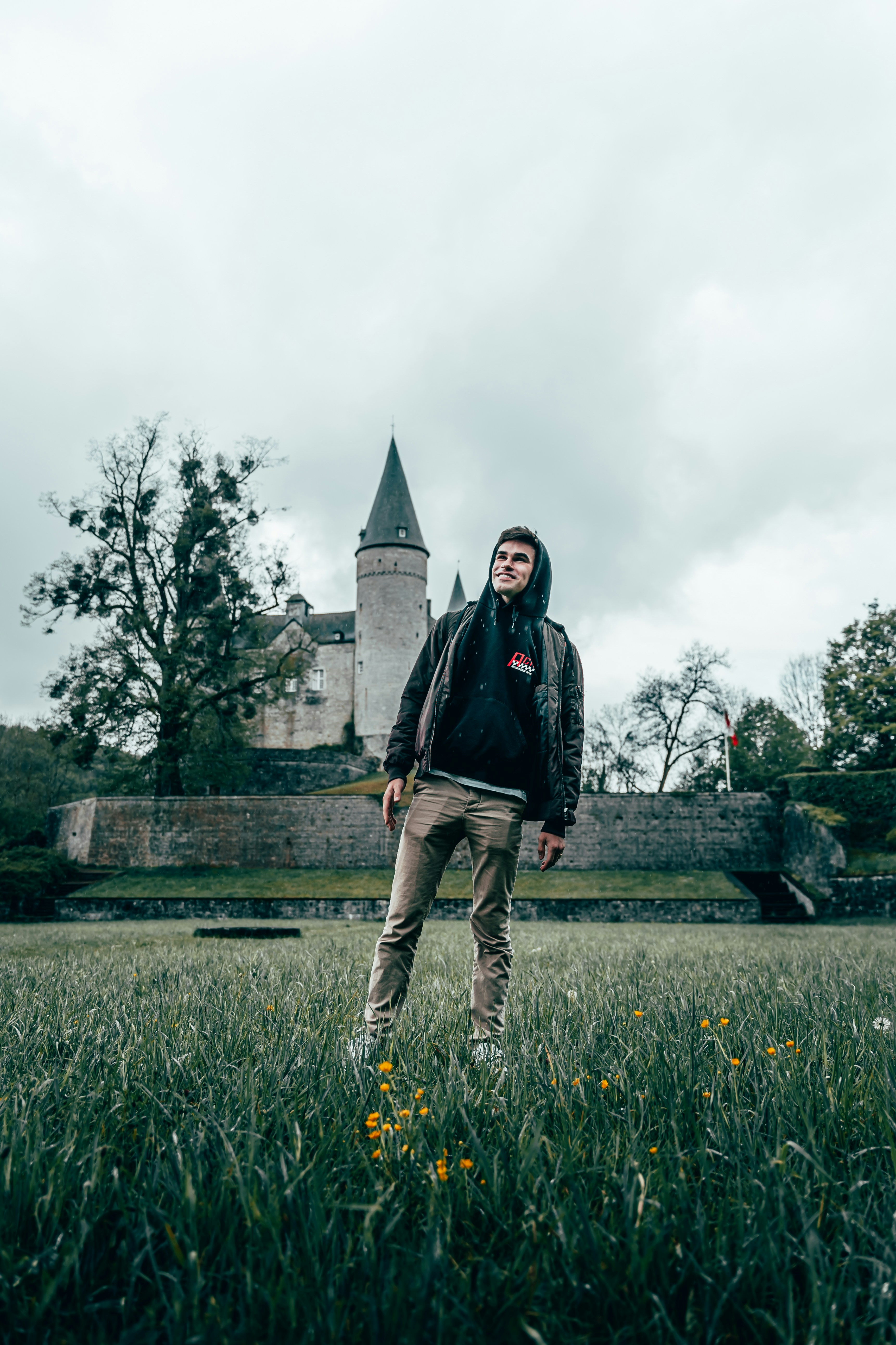 Denim in the Moat: Portrait Before the Keep