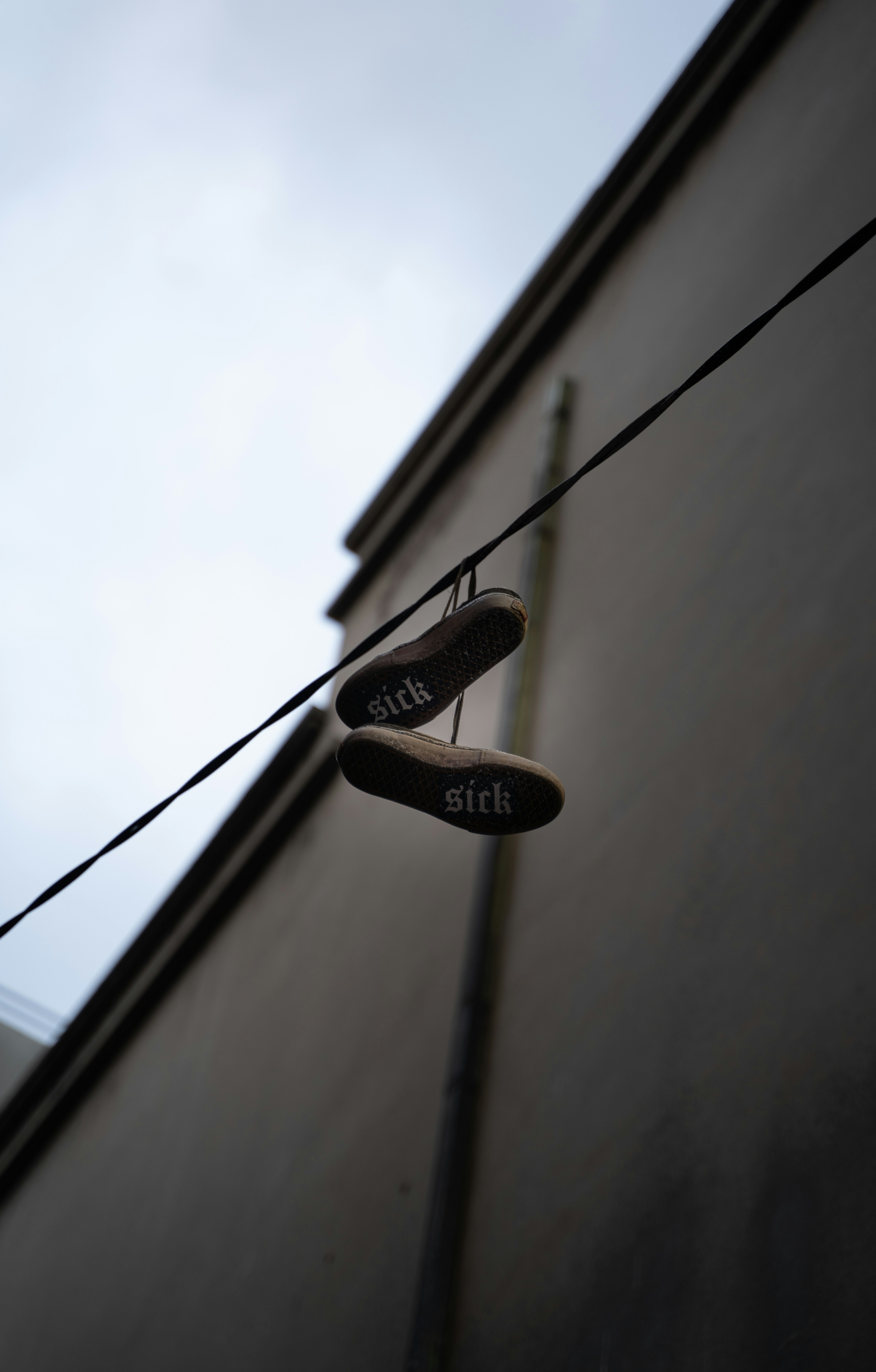 Dropped Shoes on a Wire: A Quiet Urban Detail