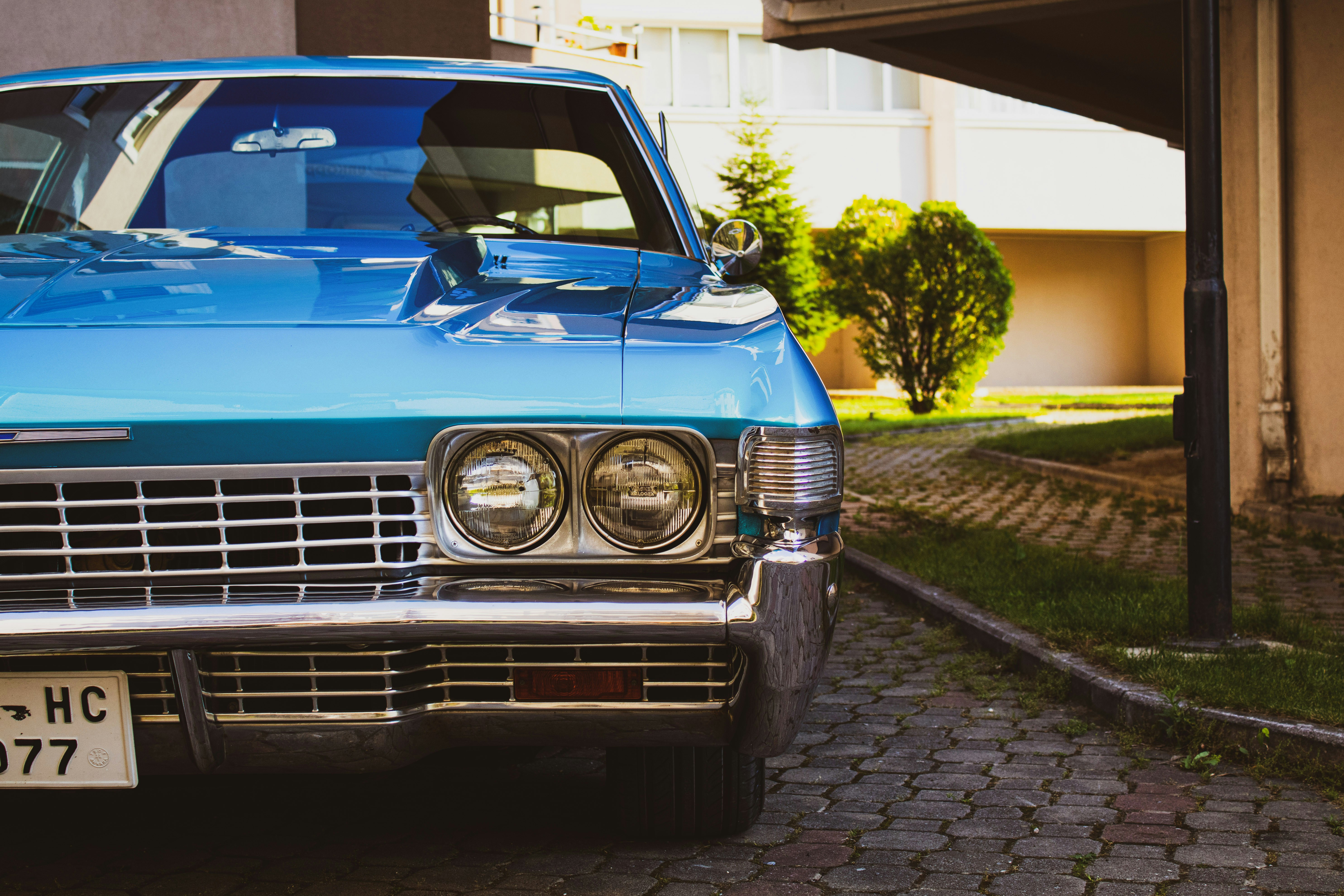 Blue car parked near green tree during daytime photo – Free 1968 Image ...