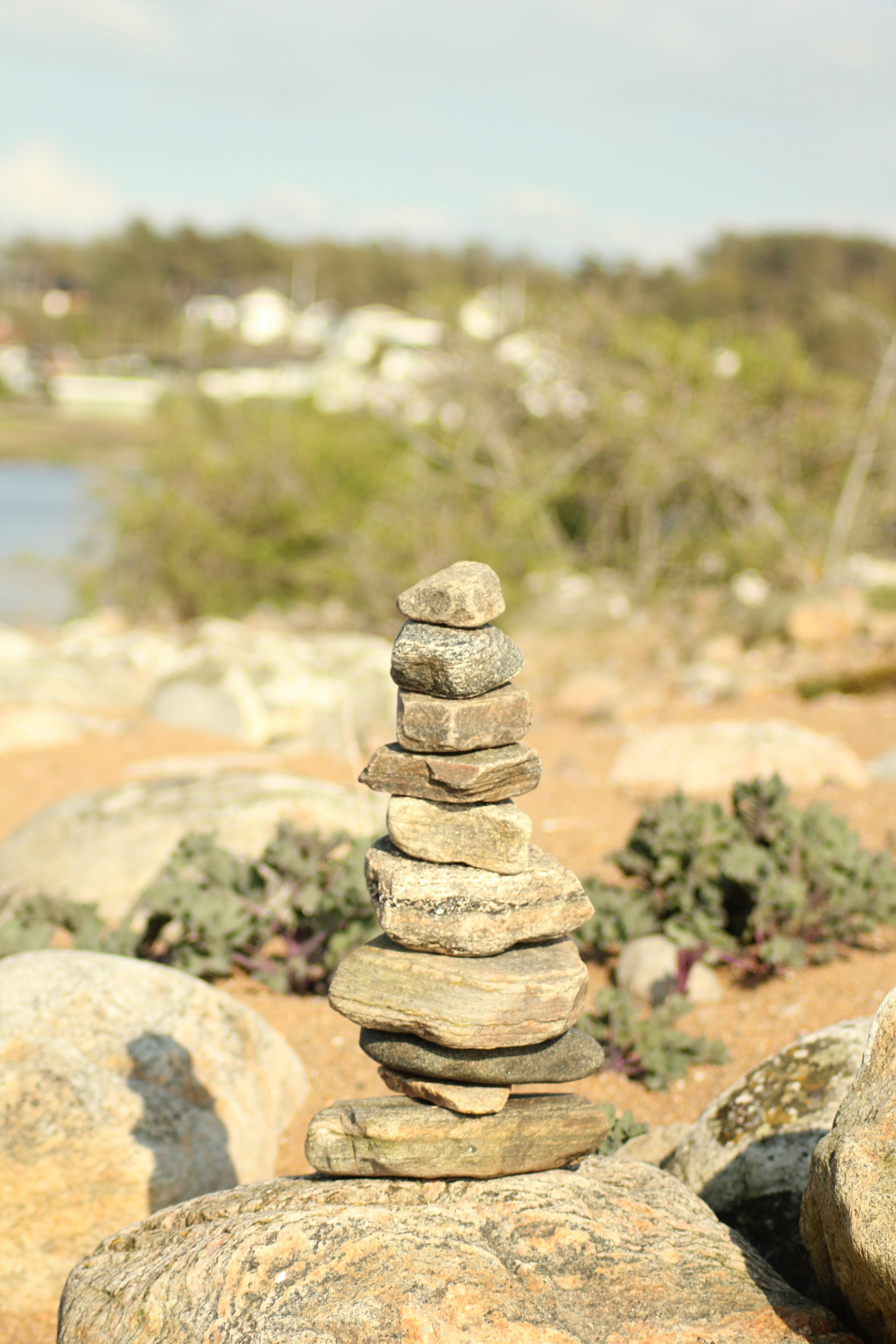Stack of gray stone near body of water during daytime photo – Free Rock ...