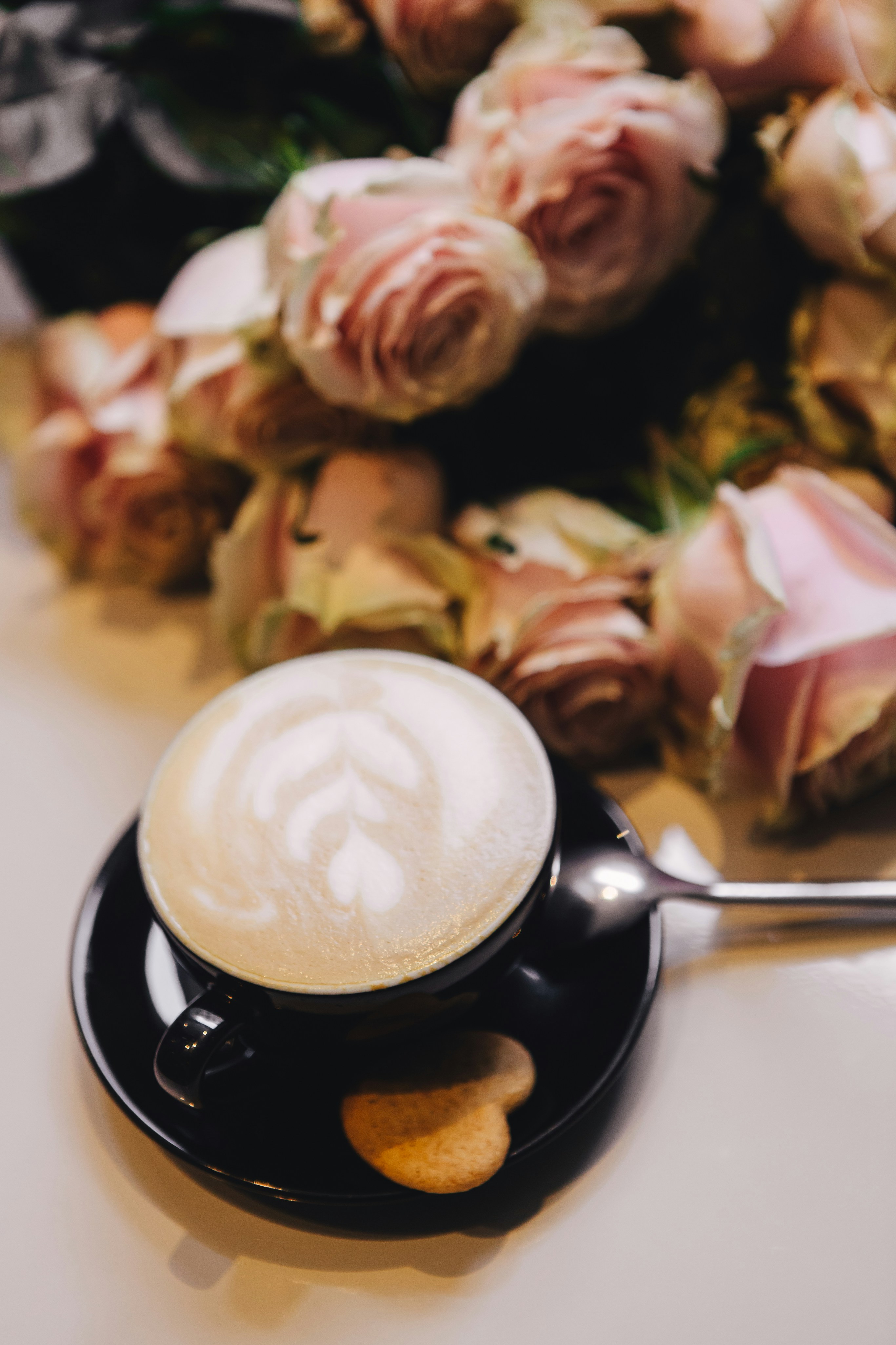 Rosette and Roses: A Quiet Café Moment