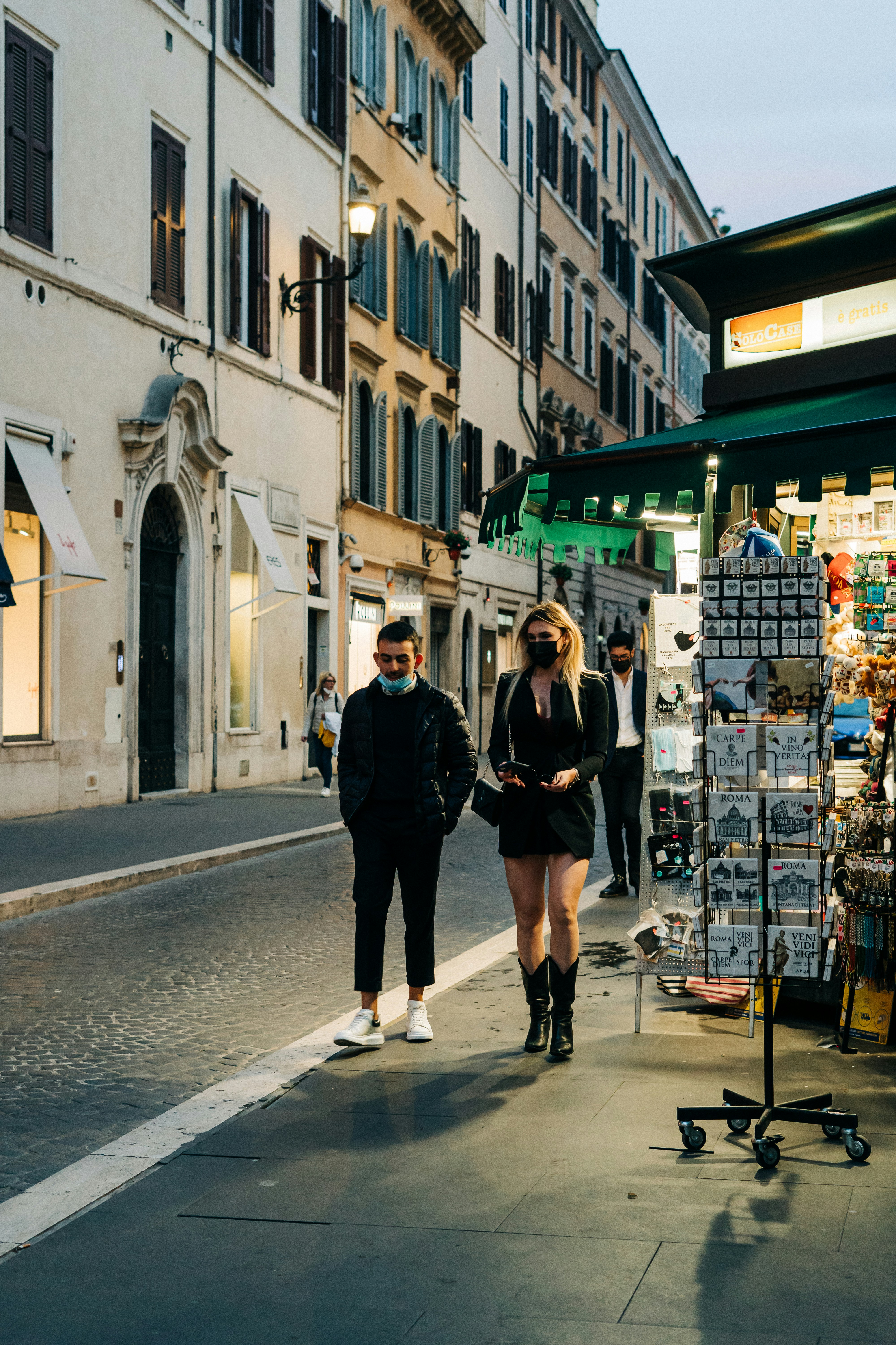 Couple on a date strolling along the streets of Rome, Italy
